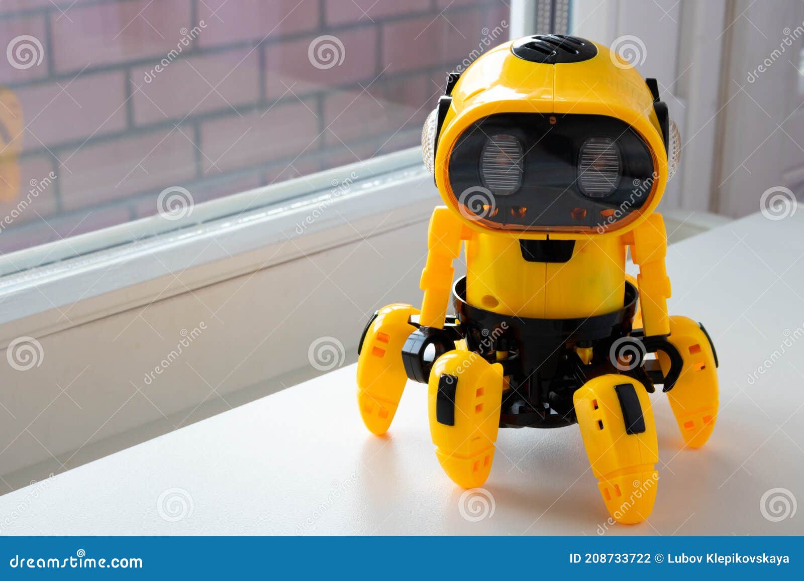 A Child S Toy, a Yellow Robot. Image Isolated on a White Background ...