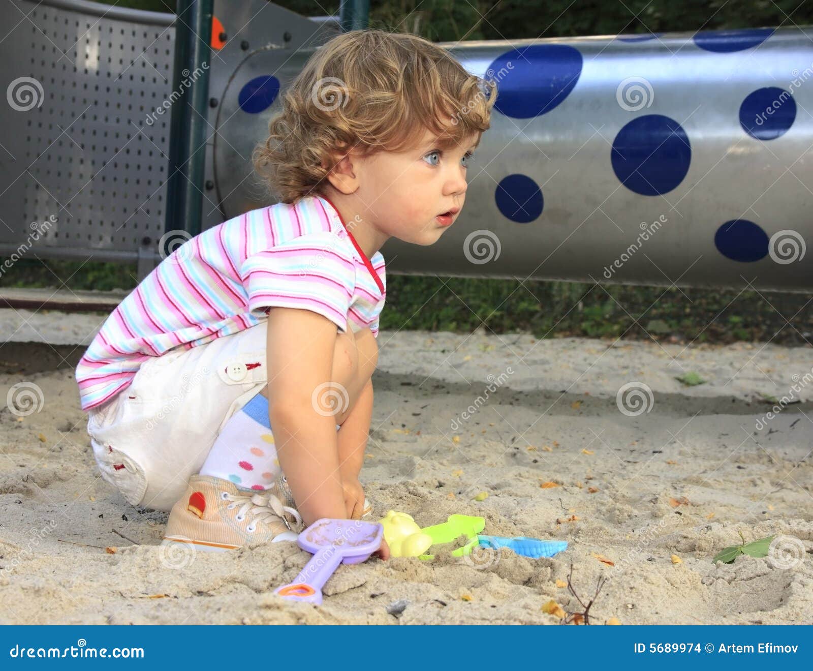 Child in the sandbox stock photo. Image of person, cute - 5689974