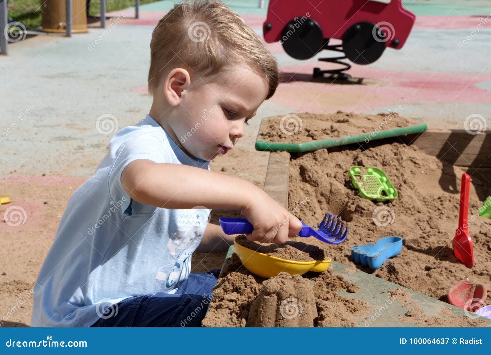 Child in sandbox stock image. Image of alone, playing - 100064637