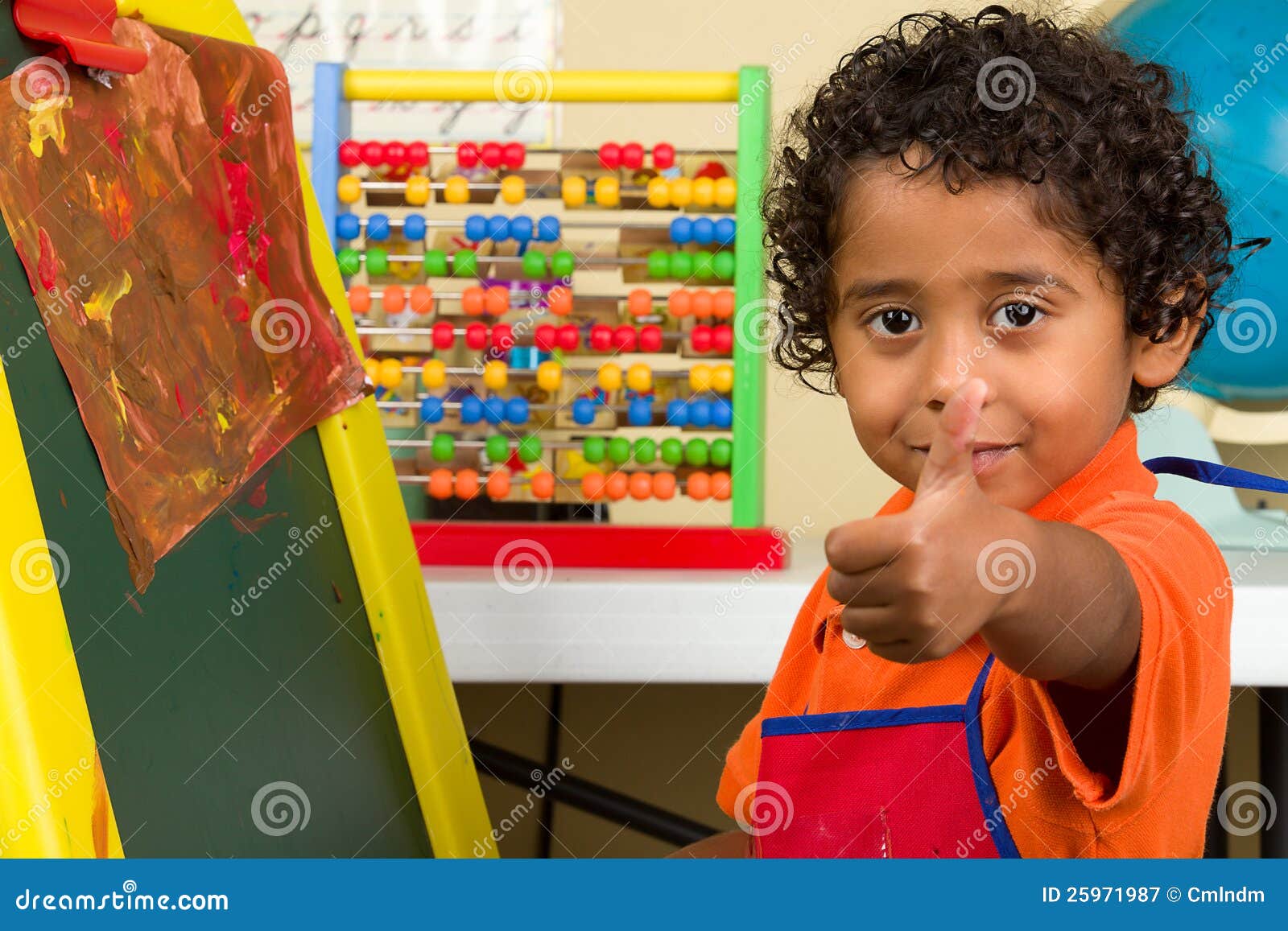 Child in School with Thumb Up Stock Image - Image of hispanic, learning ...
