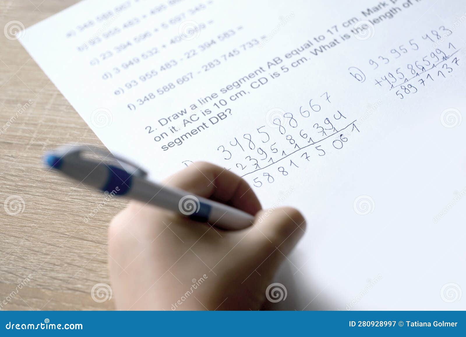 Child, Schoolchild Hesitantly Solves Difficult Task of Adding Numbers ...