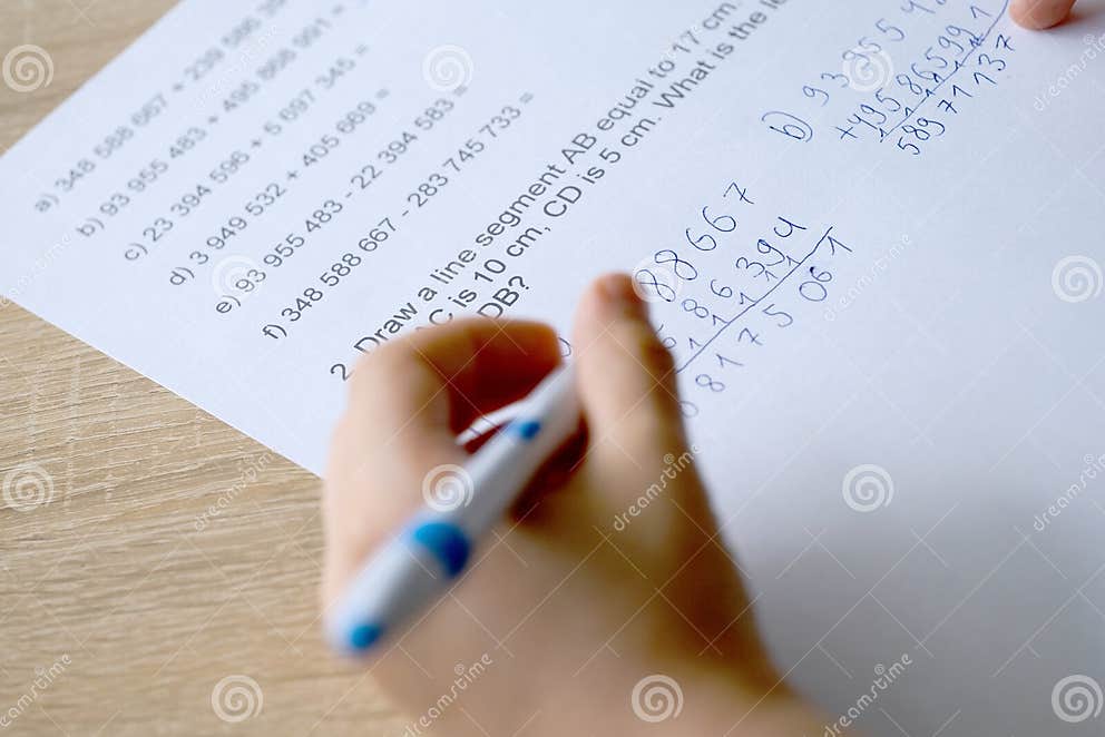 Child, Schoolchild Hesitantly Solves Difficult Task of Adding Numbers ...