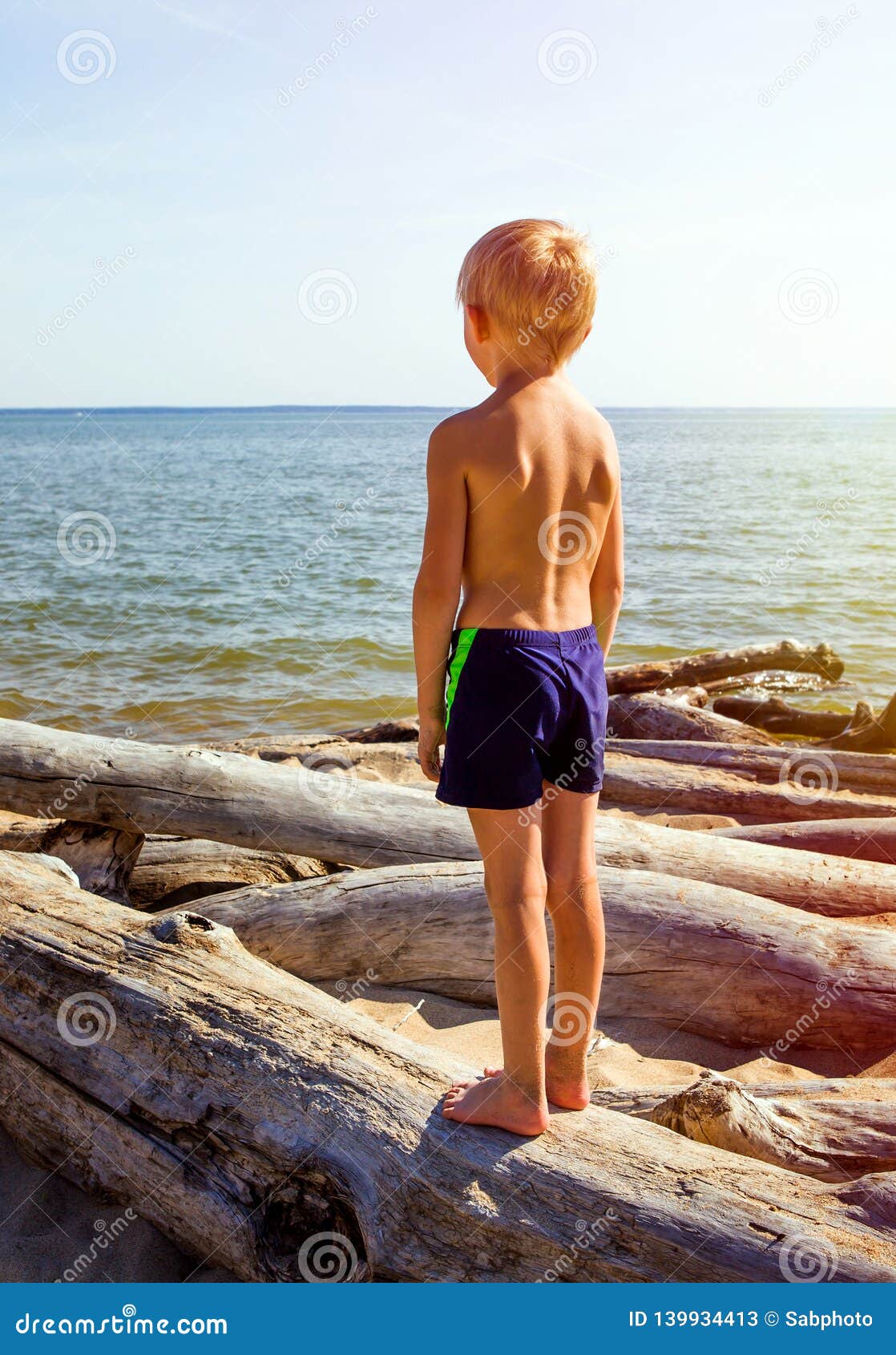 Child at Seaside stock image. Image of blond, beach - 139934413