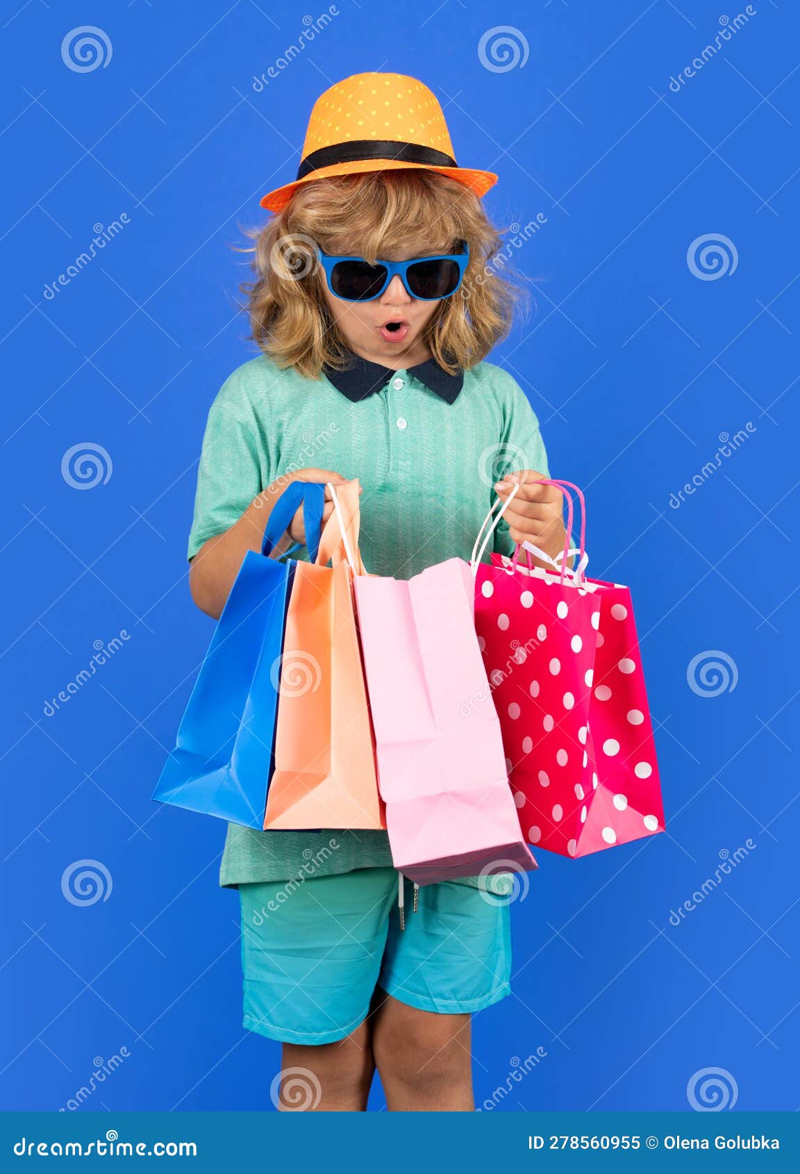 Child with Shopping Bag in Studio. Little Shopper Kid. Stock Image ...