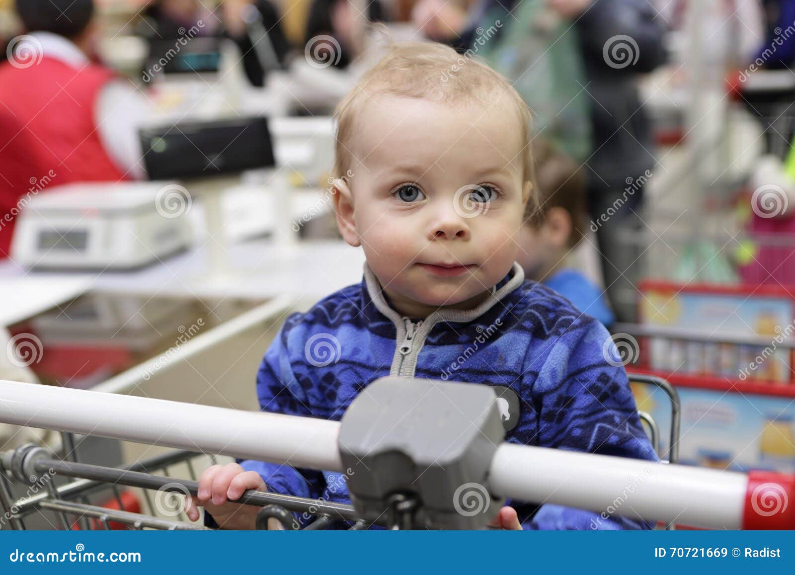 Child in shopping cart stock image. Image of activity - 70721669