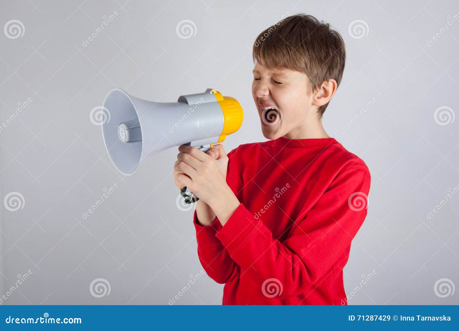Child Shouting in Megaphone on Bright Background Stock Image - Image of ...