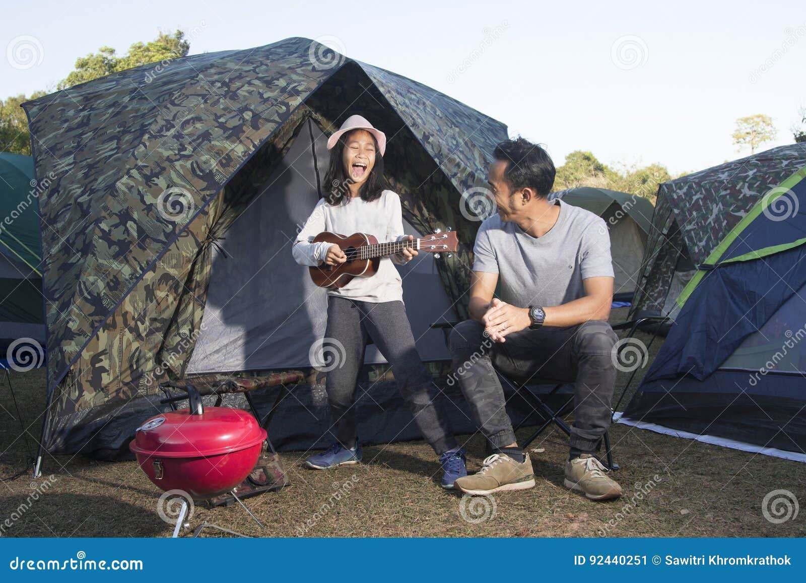 Child Singing with Family on Camping Stock Image - Image of happiness ...