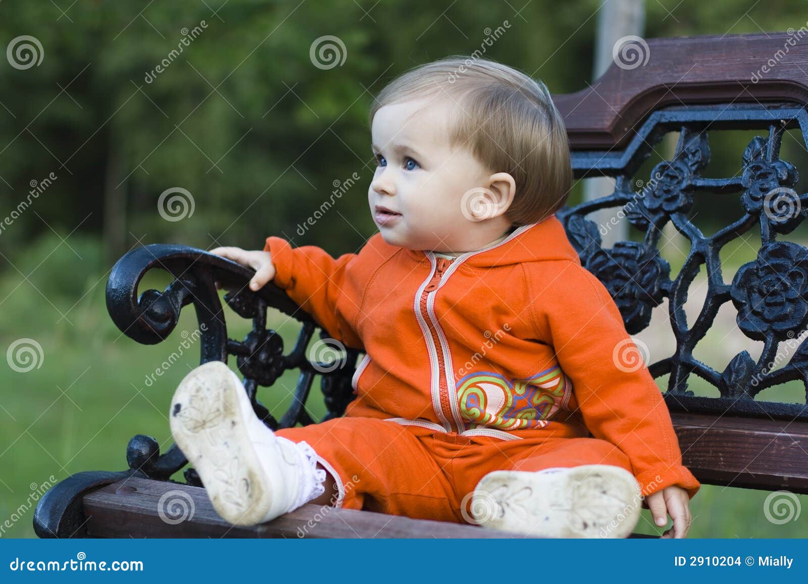 Child Sitting On The Bench Stock Images - Image: 2910204
