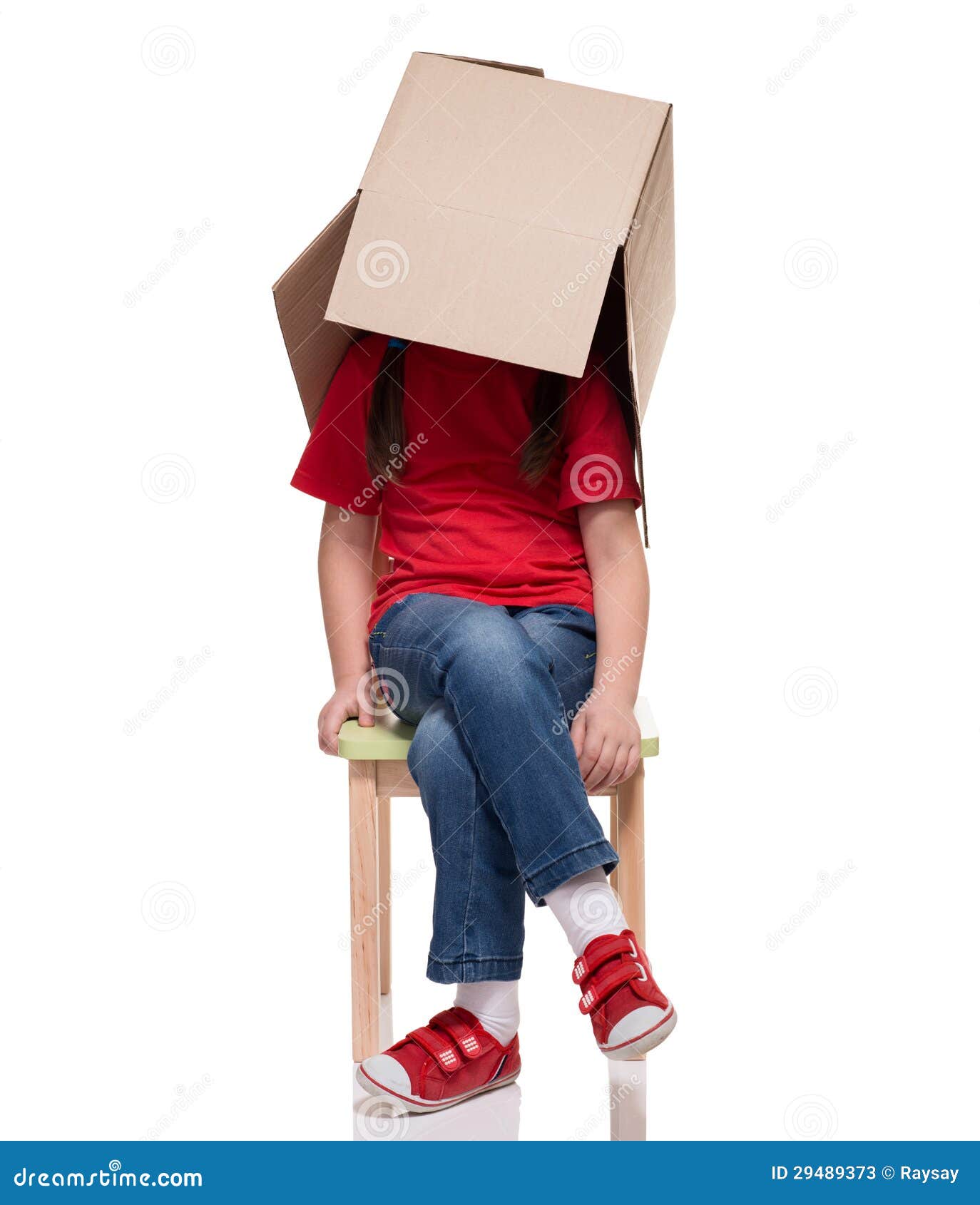 Child Sitting on a Chair with Big Box Covered Head Stock Image - Image ...
