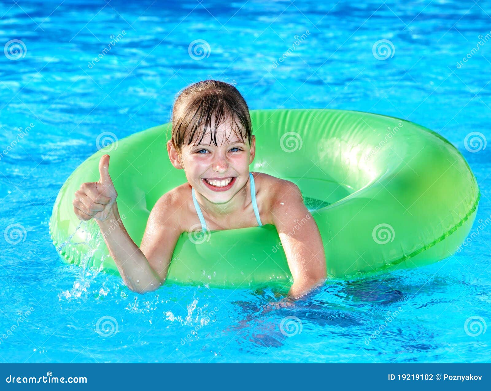 Child Sitting on Inflatable Ring Thumb Up. Stock Photo - Image of ...