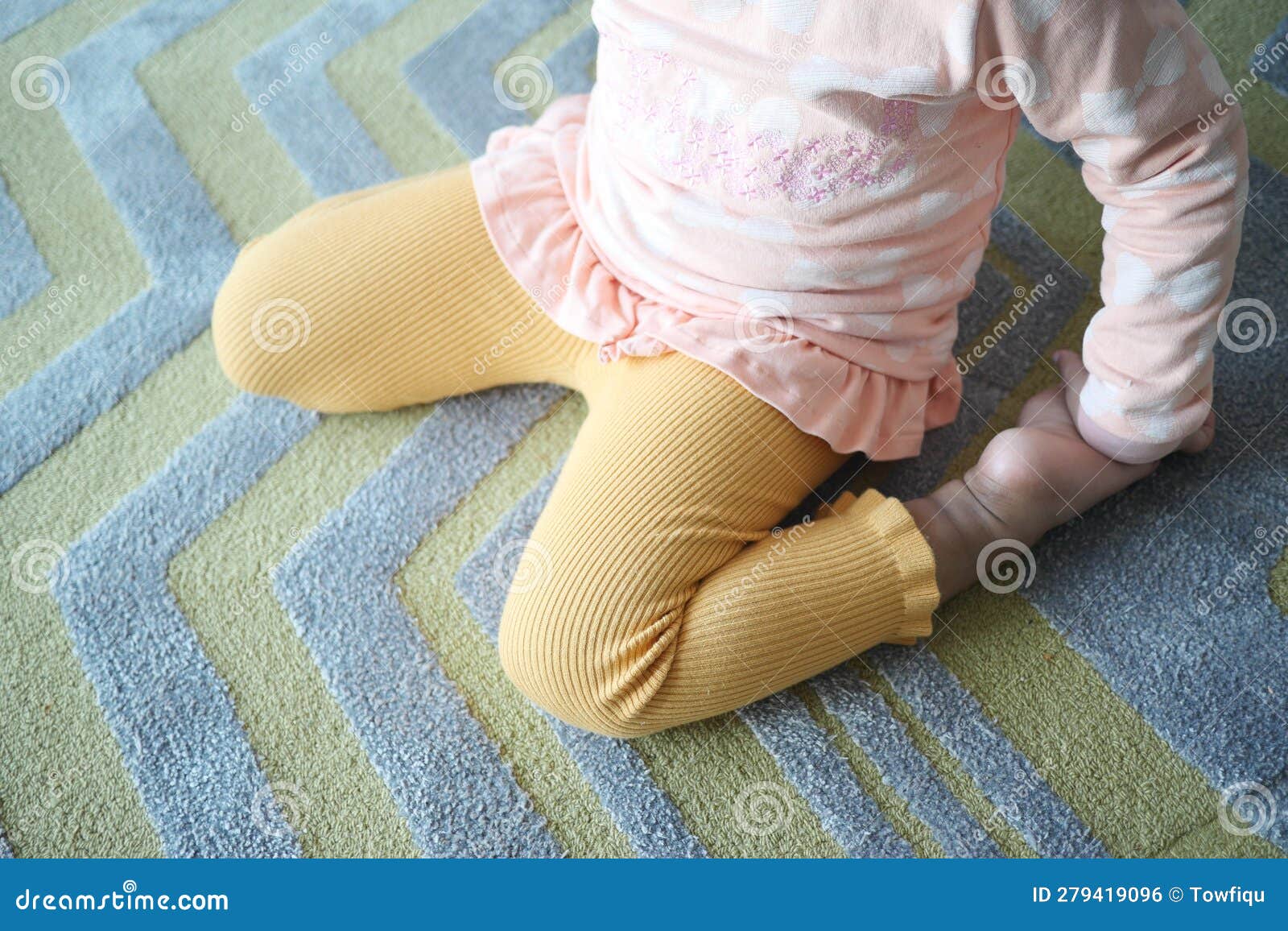 Child Sitting W Posture on the Floor . Stock Photo - Image of children ...