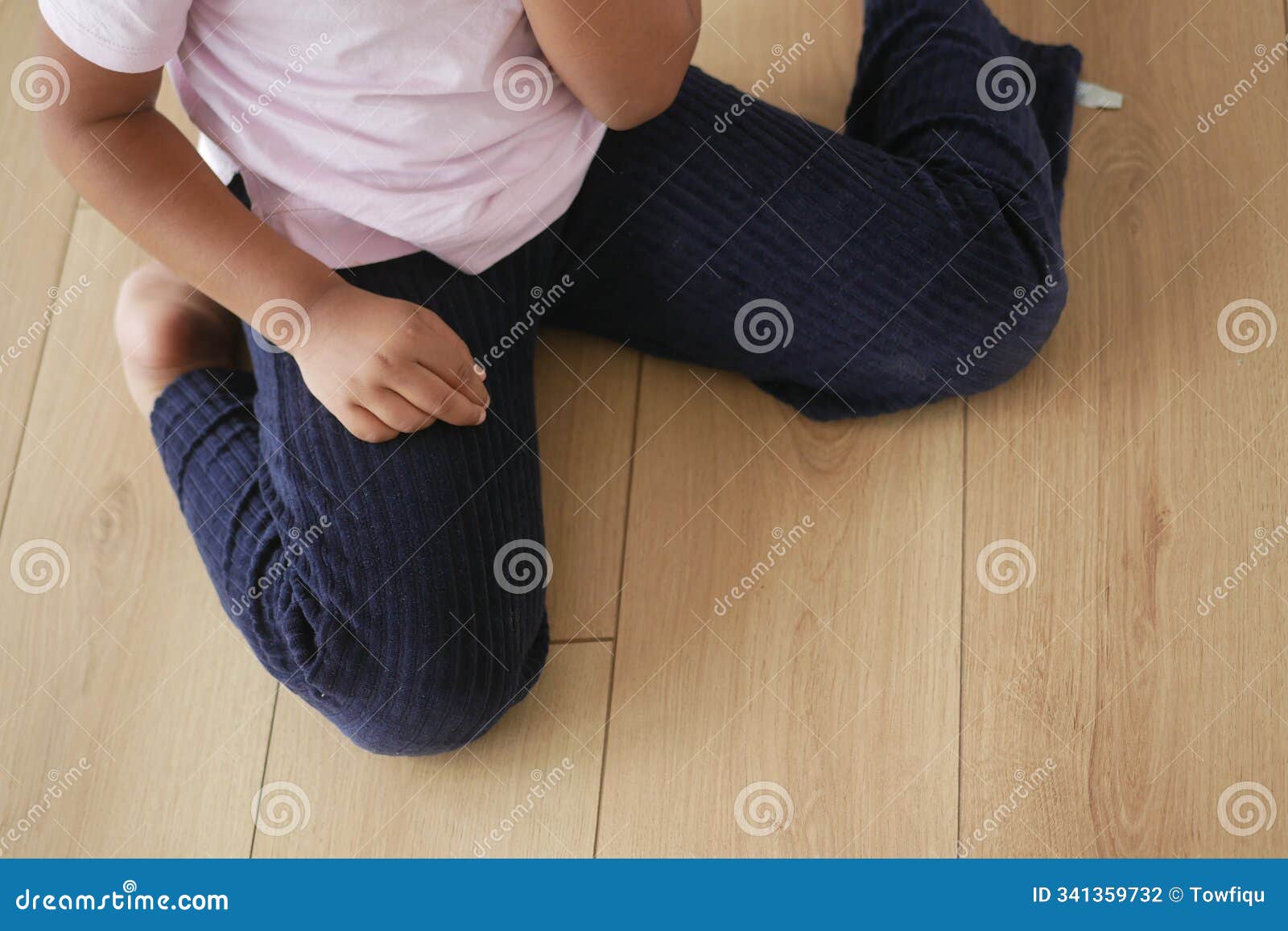 Child Sitting W Posture on the Floor . Stock Photo - Image of floor ...