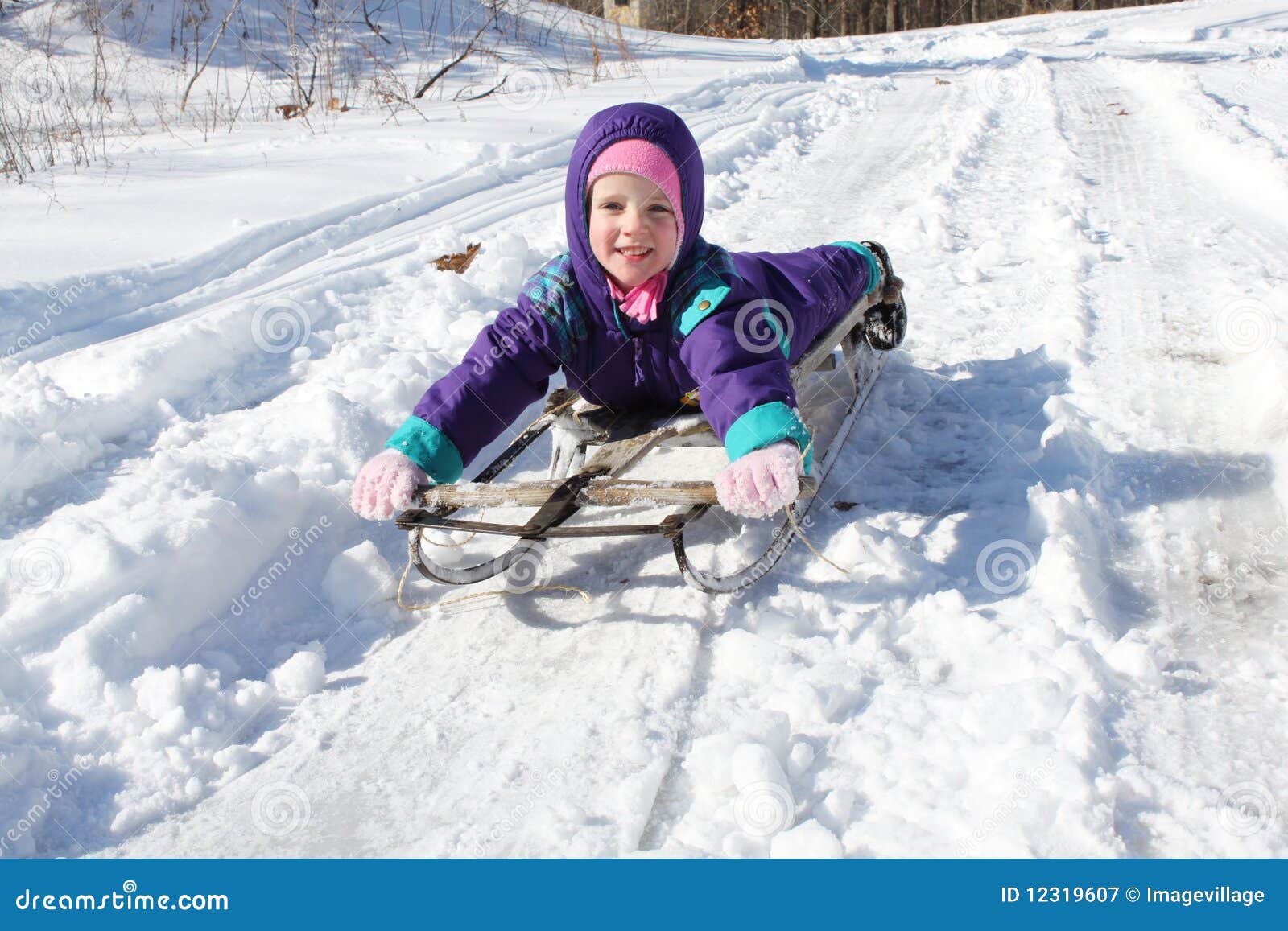 Child on a sled stock image. Image of adorable, holiday - 12319607