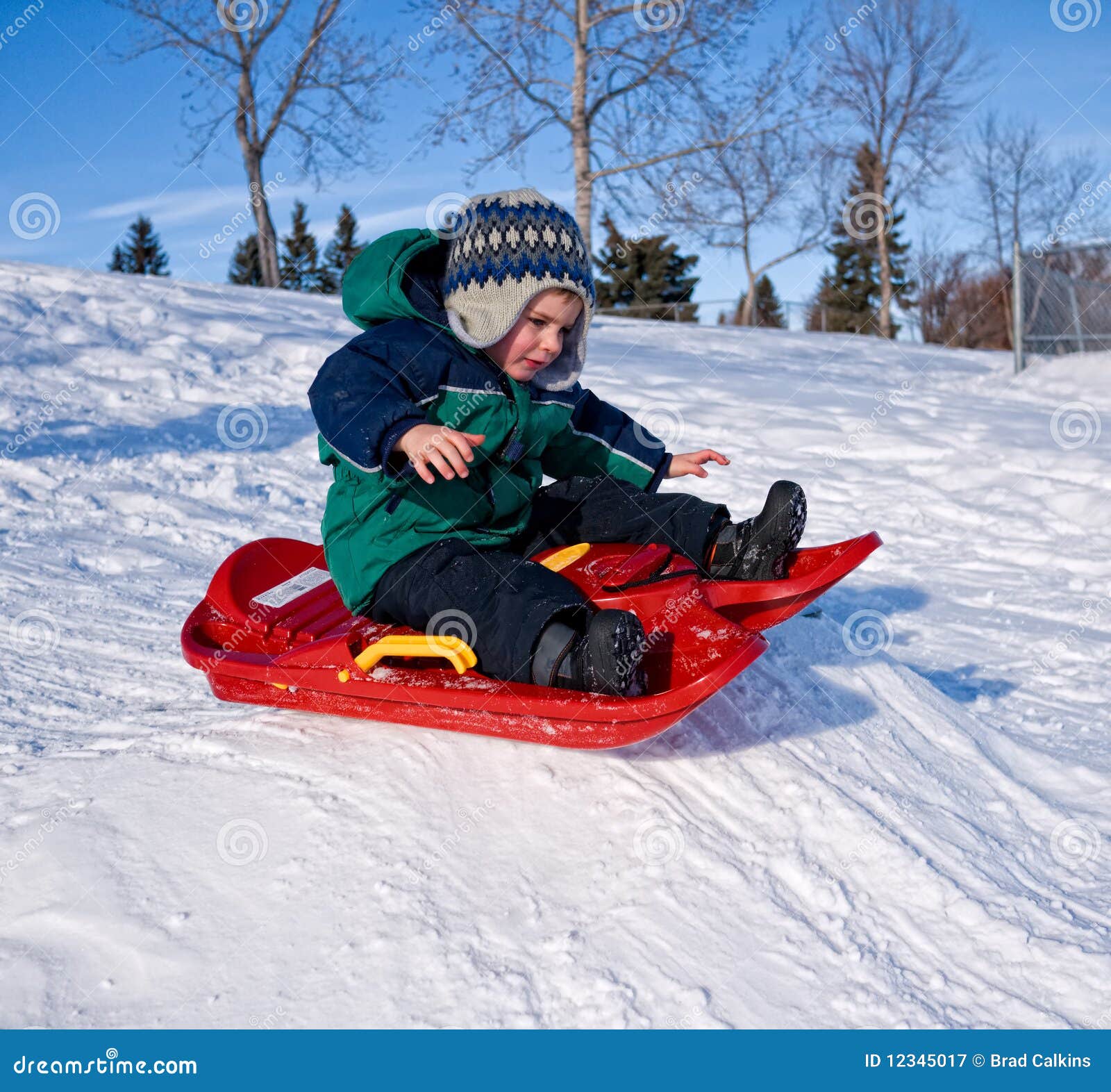 Child sledding stock image. Image of slode, play, activity - 12345017