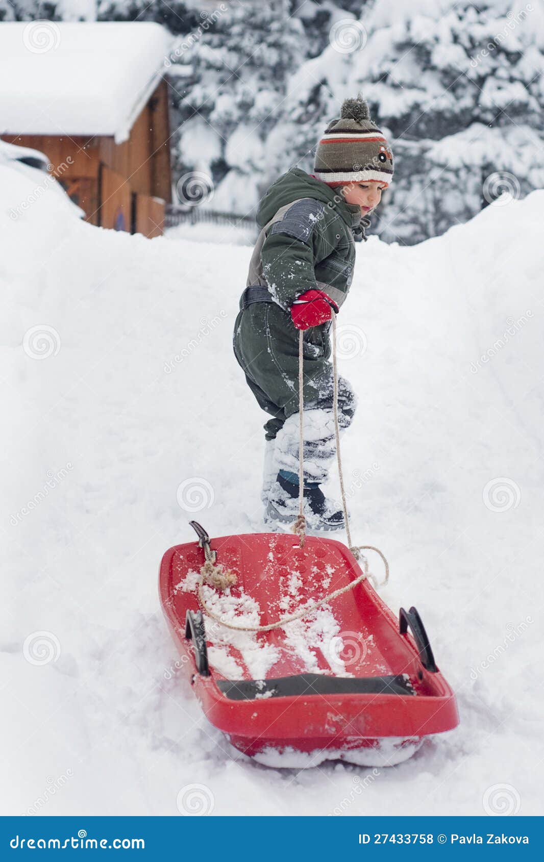 Child on sledge stock photo. Image of plastic, sled, sledge - 27433758
