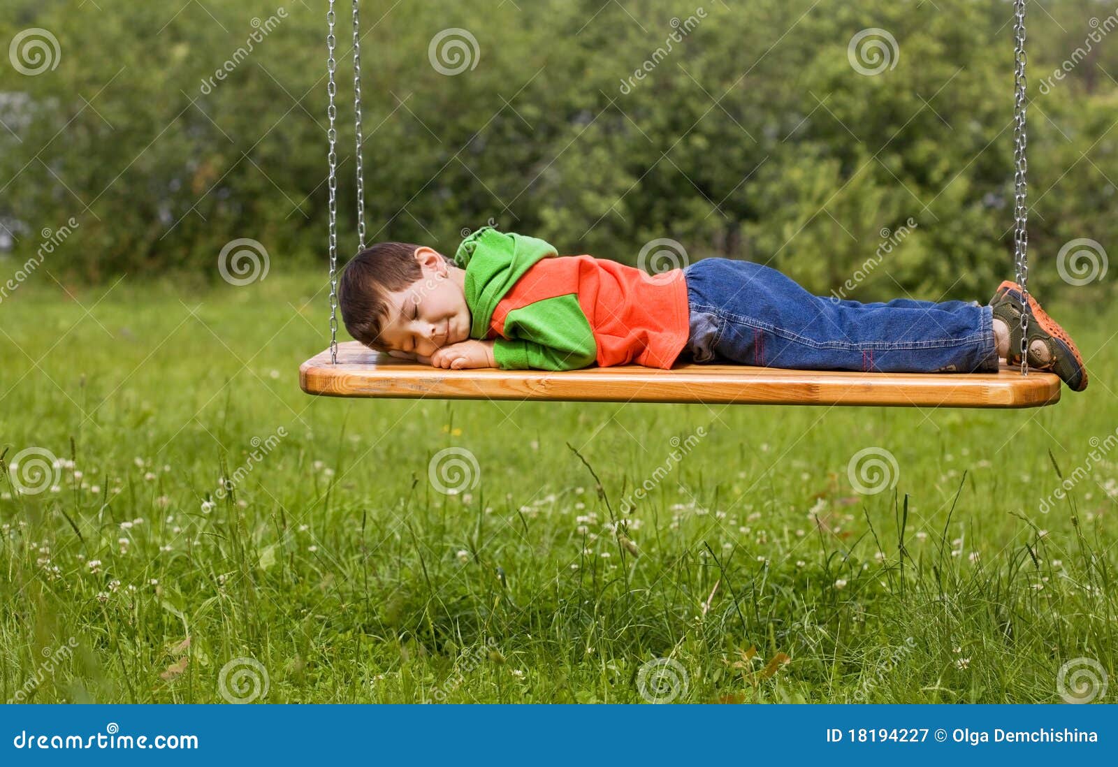 Child sleeping on a swing stock image. Image of cute - 18194227