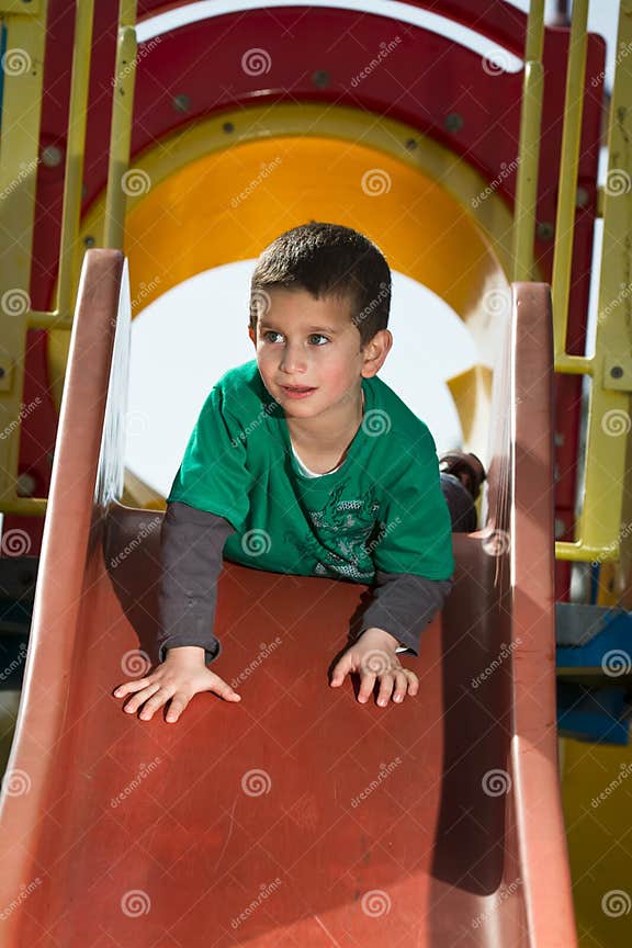 Child on slide stock image. Image of laugh, male, happy - 18556601