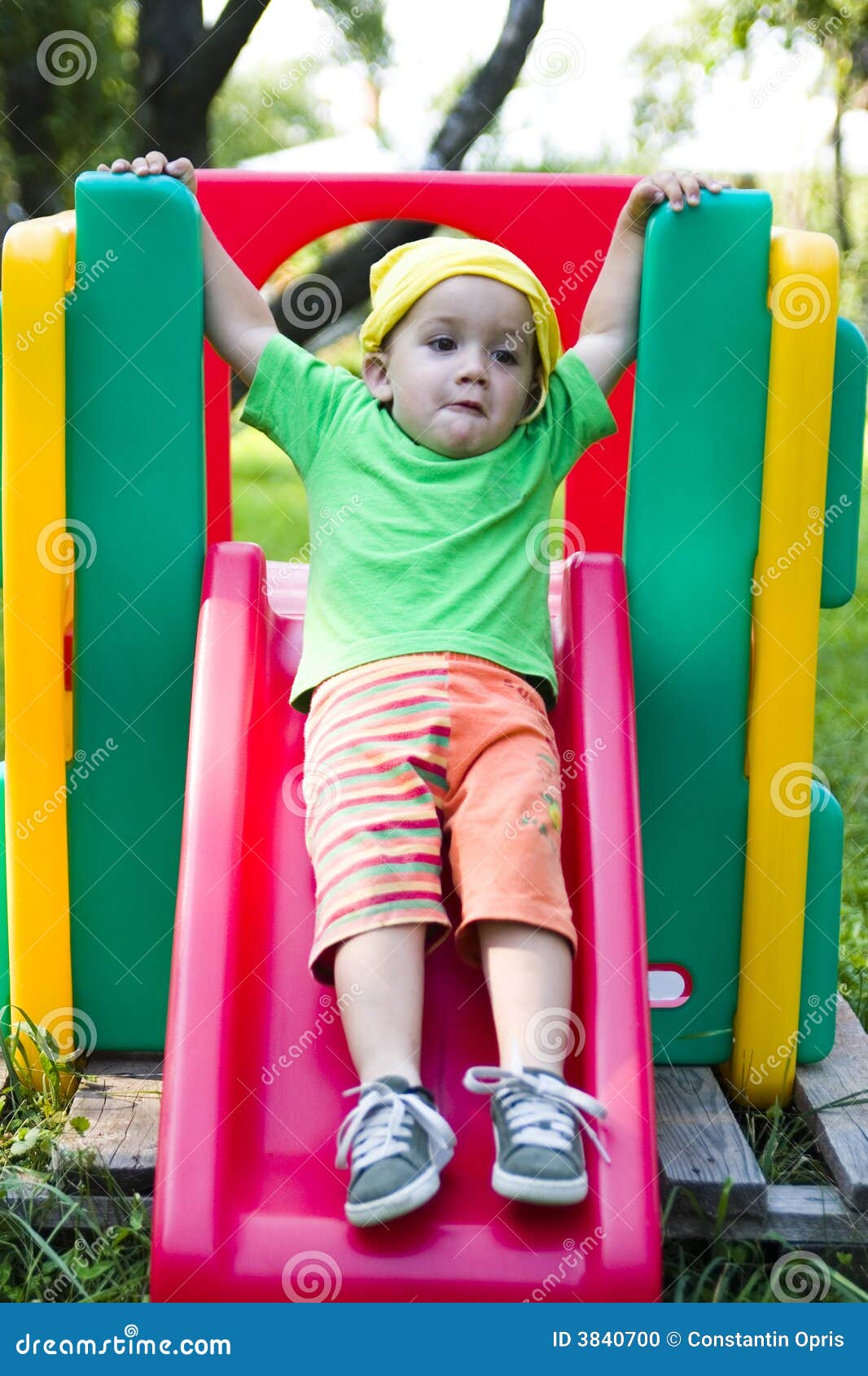 Child on slide stock photo. Image of adorable, outdoor - 3840700
