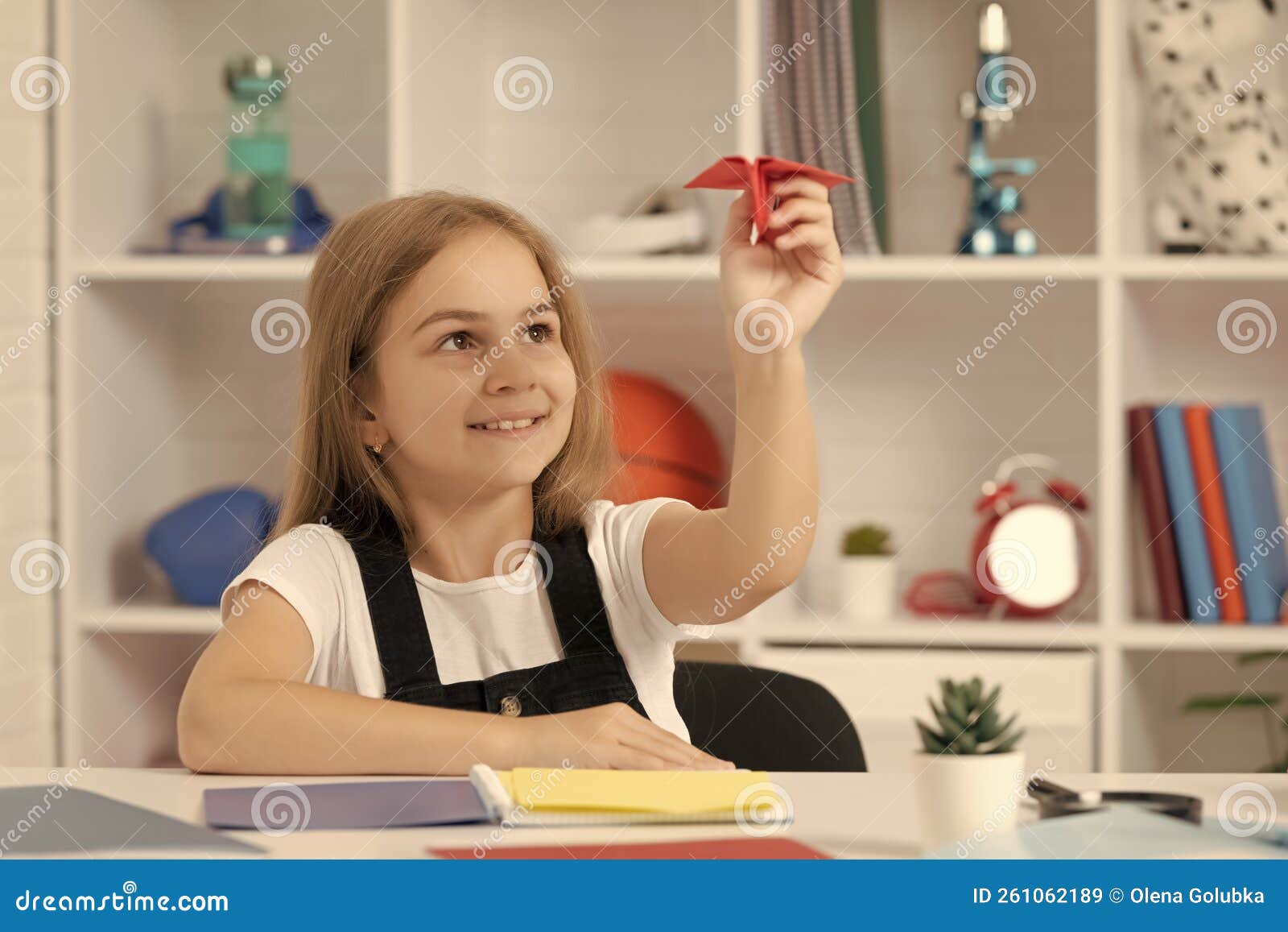 Child Smile and Play with Paper Plane in School Classroom Stock Image ...