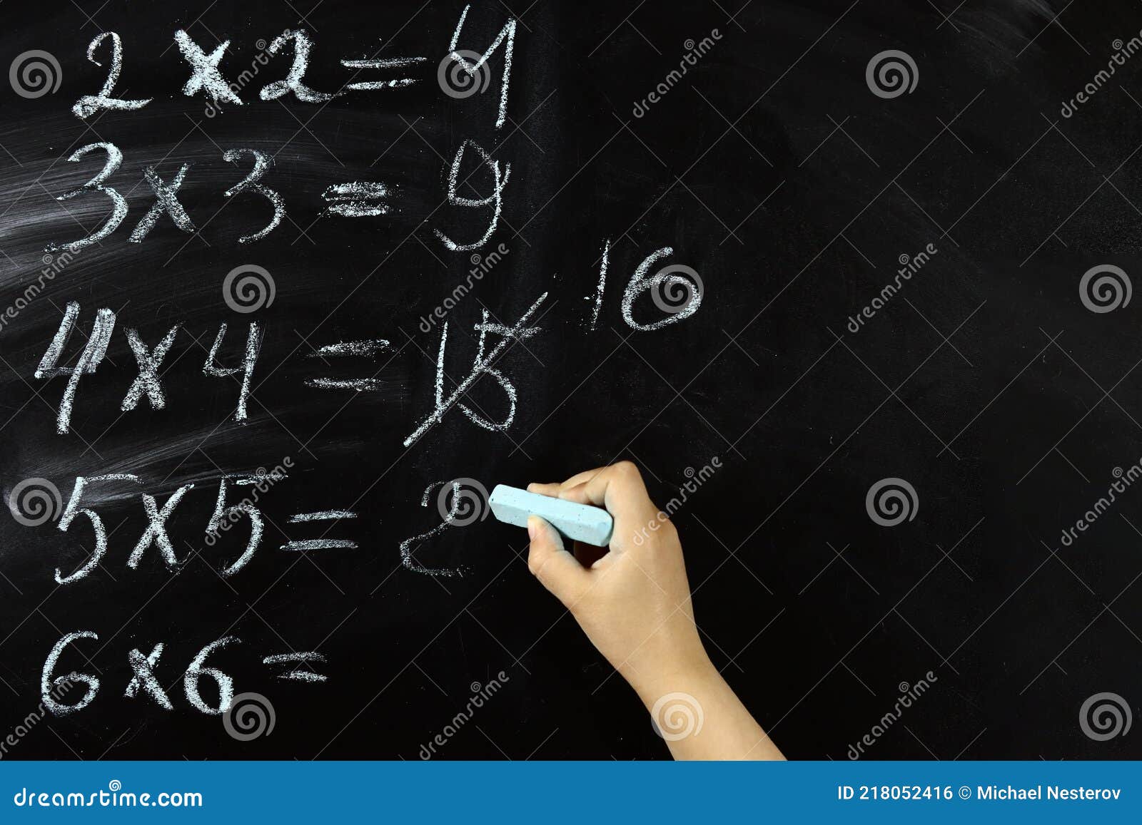 Child Solves Mathematical Examples on the School Blackboard Stock Photo ...