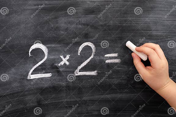 Child Solving Math Problem on the Blackboard Stock Photo - Image of ...