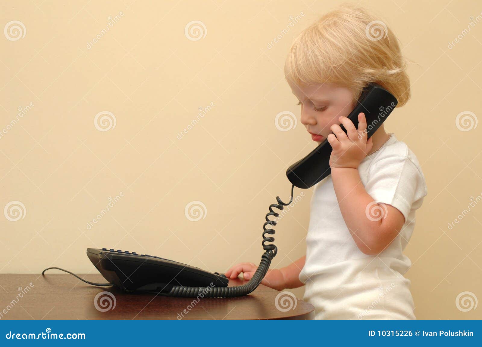 Child speaks on telephone stock photo. Image of little - 10315226