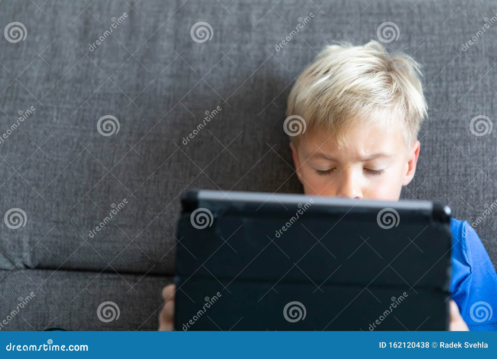 Little Boy Playing on Tablet Stock Photo - Image of business, childhood ...