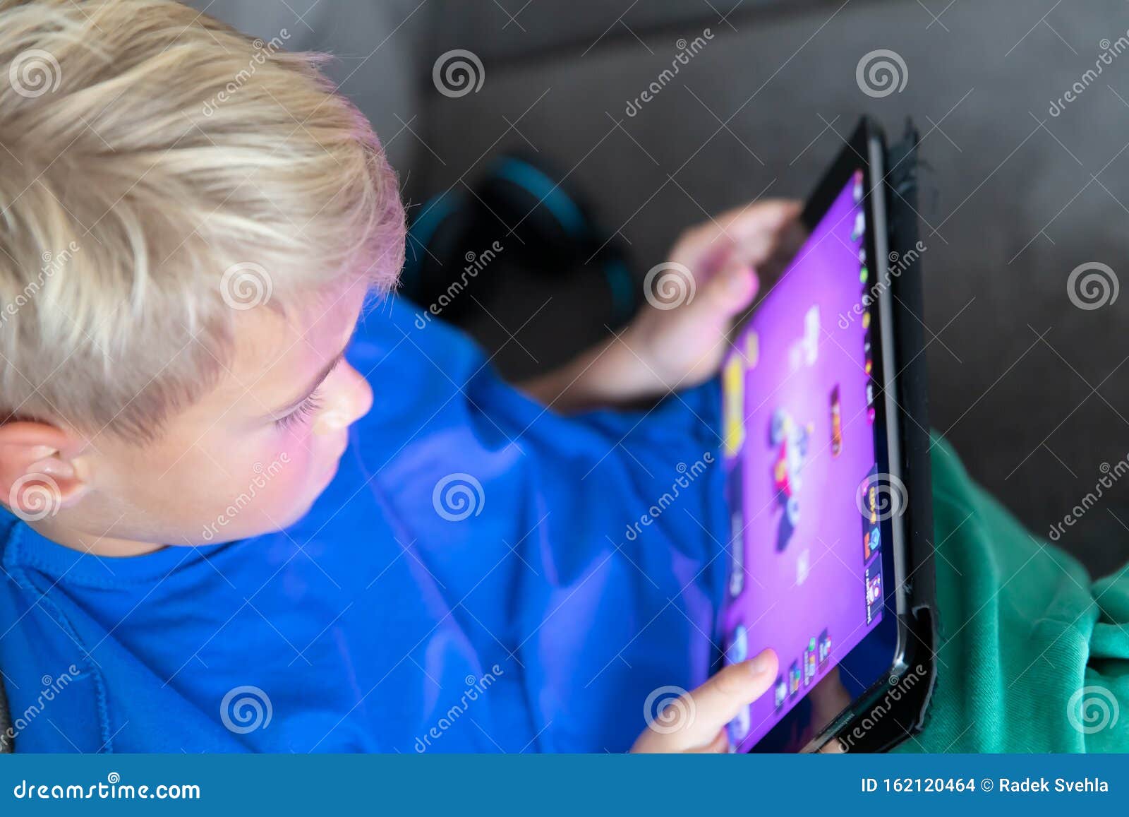 Little Boy Playing on Tablet Stock Photo - Image of caucasian ...