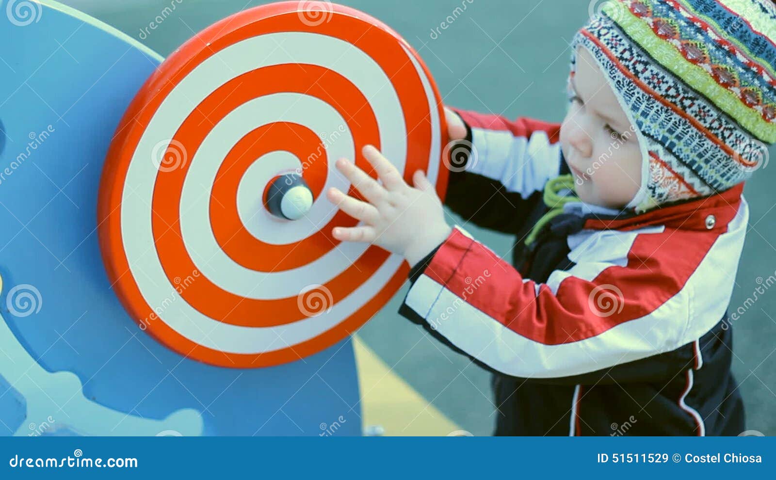 Child Spinning a Spiral Wheel Stock Video - Video of spin, outside ...