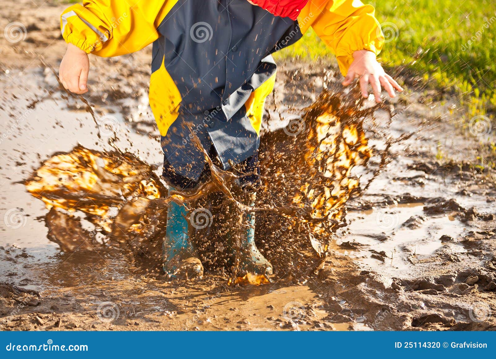 Child Splashing in Muddy Puddle Stock Photo - Image of splashing ...