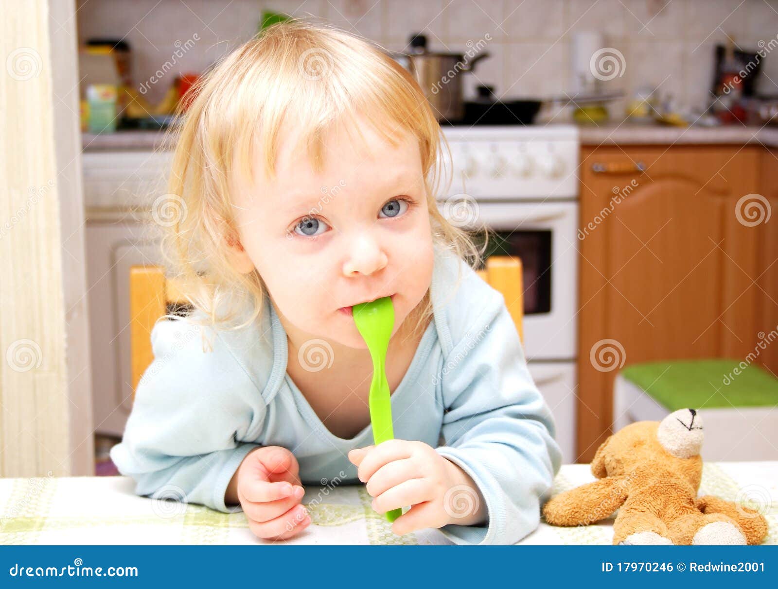 Child with a spoon stock photo. Image of happiness, childhood - 17970246