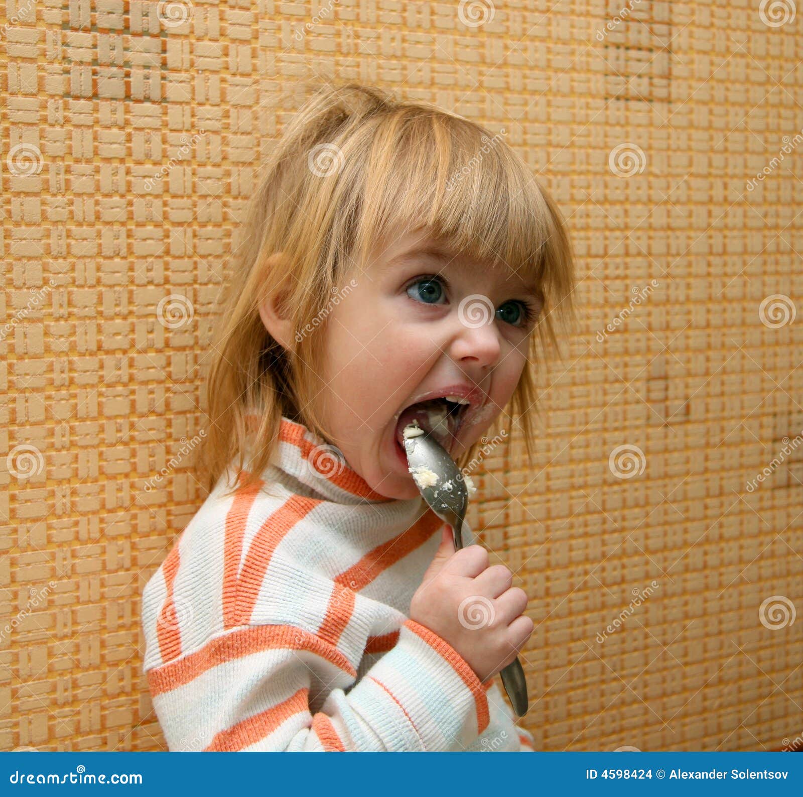 Child with the spoon stock photo. Image of eyes, hair - 4598424