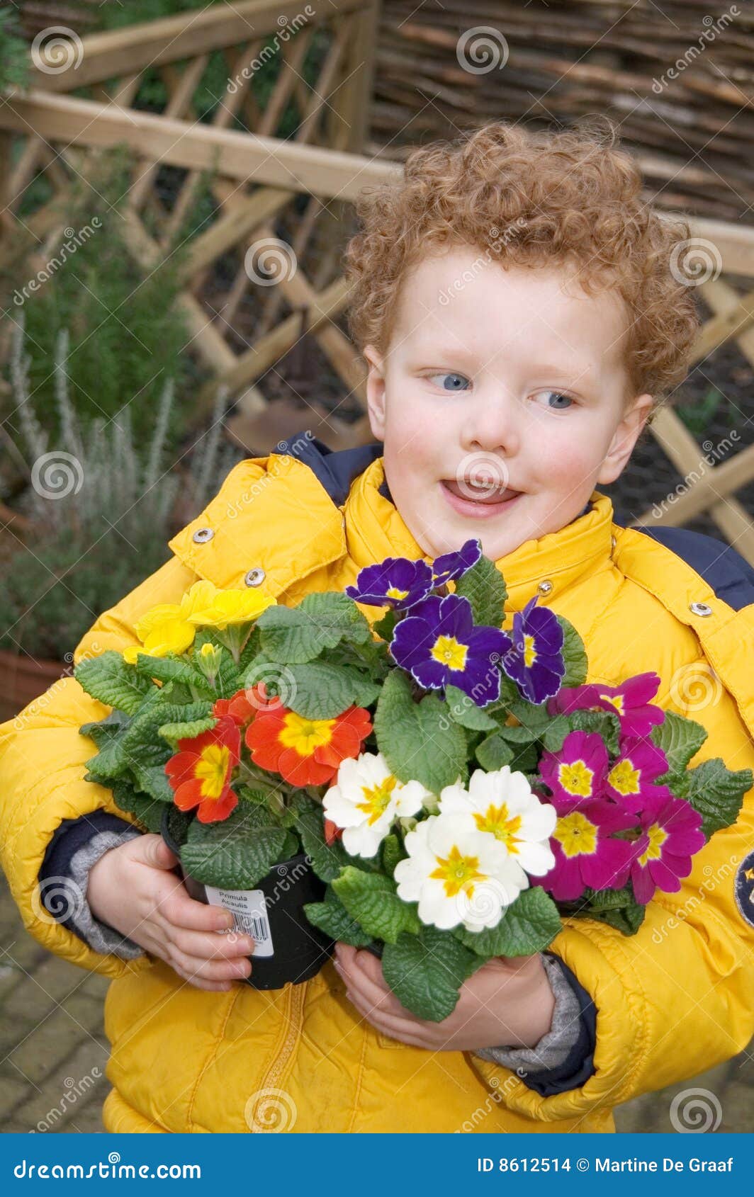 Child with Spring Flowers stock photo. Image of gift, colored - 8612514