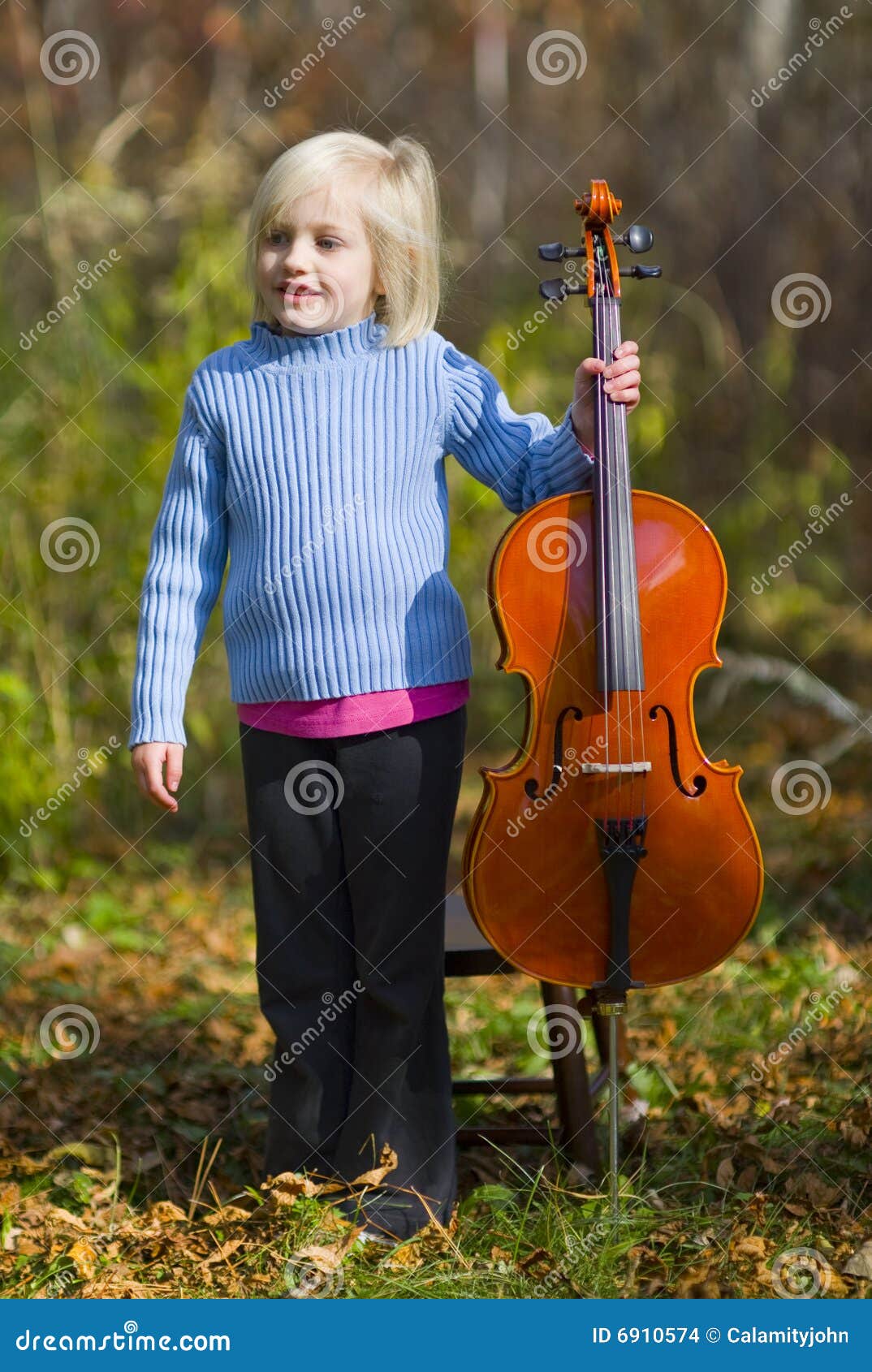 Child Standing with Cello stock photo. Image of classic - 6910574