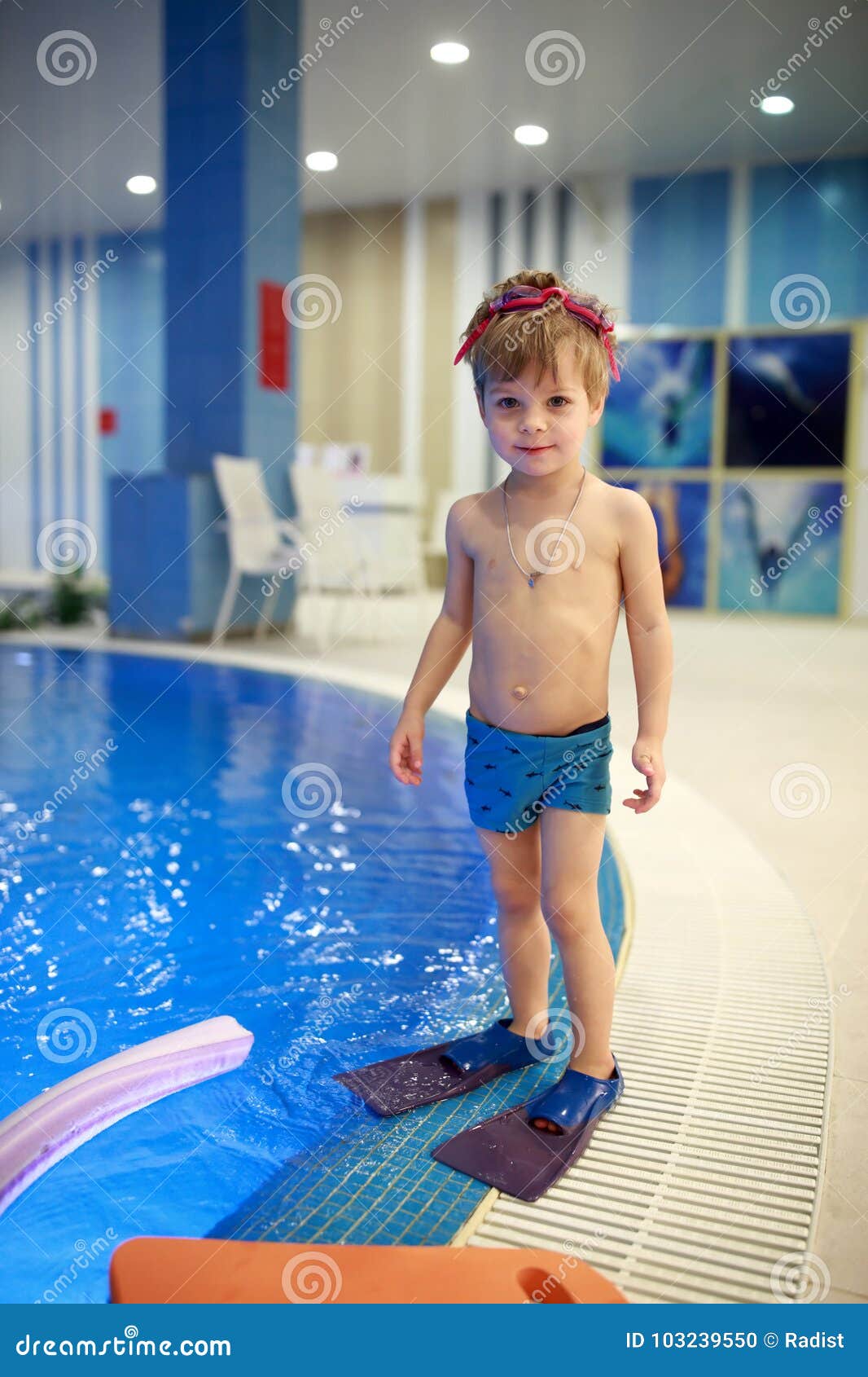Child standing in flippers stock photo. Image of diver - 103239550