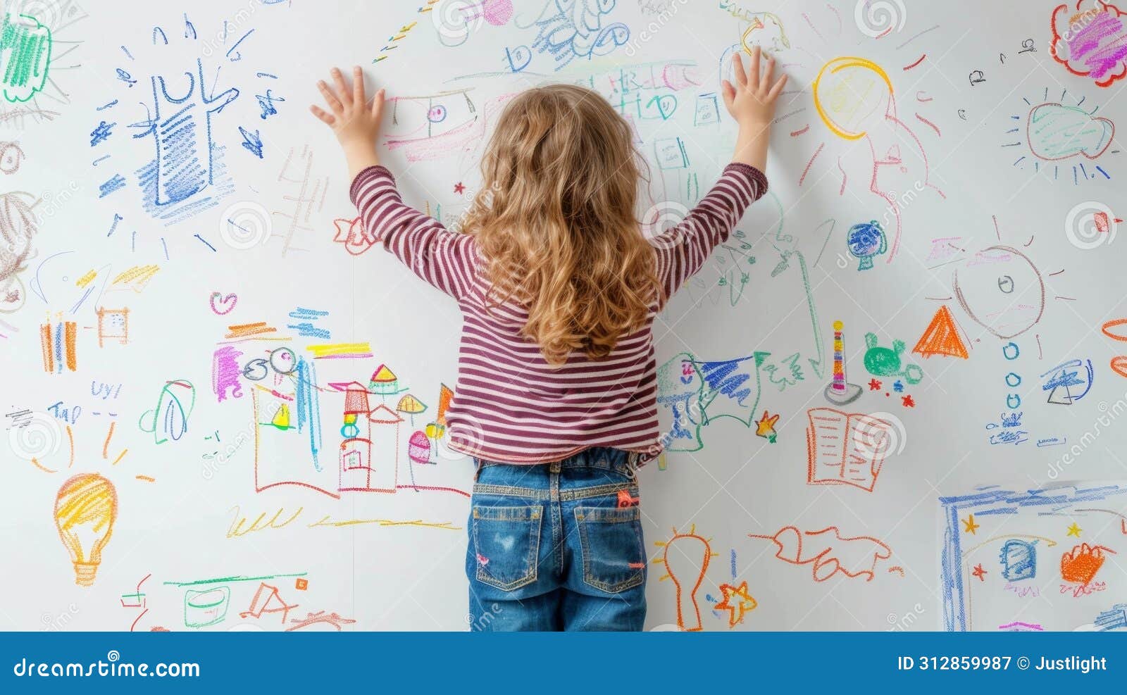A Child Standing in Front of a White Board with Colorful Drawings and ...