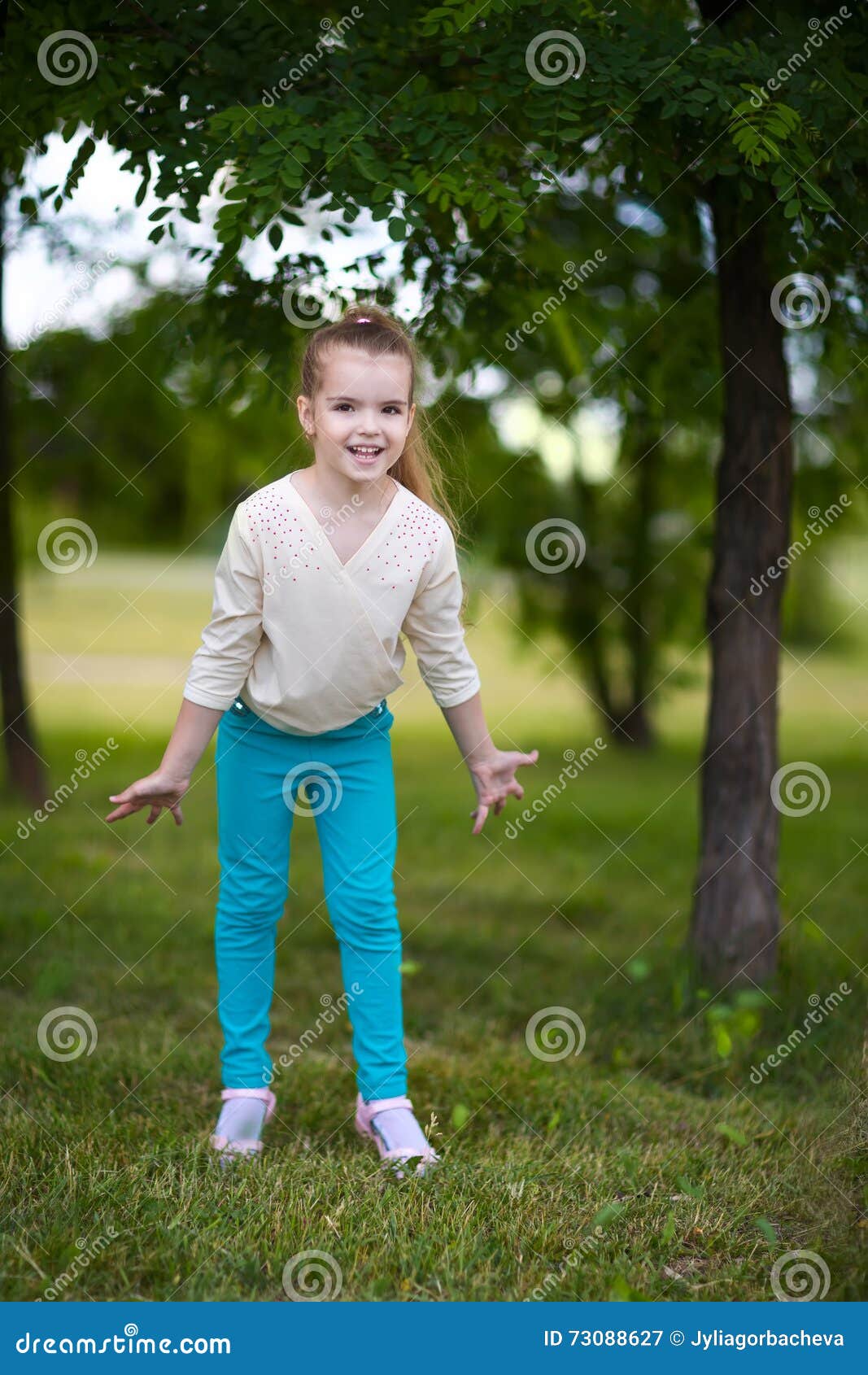 Child standing near tree stock image. Image of garden - 73088627