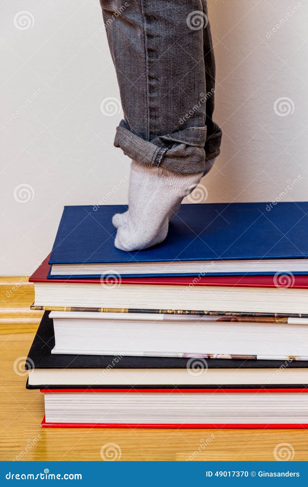 Child Standing on a Stack of Books Stock Photo - Image of education ...