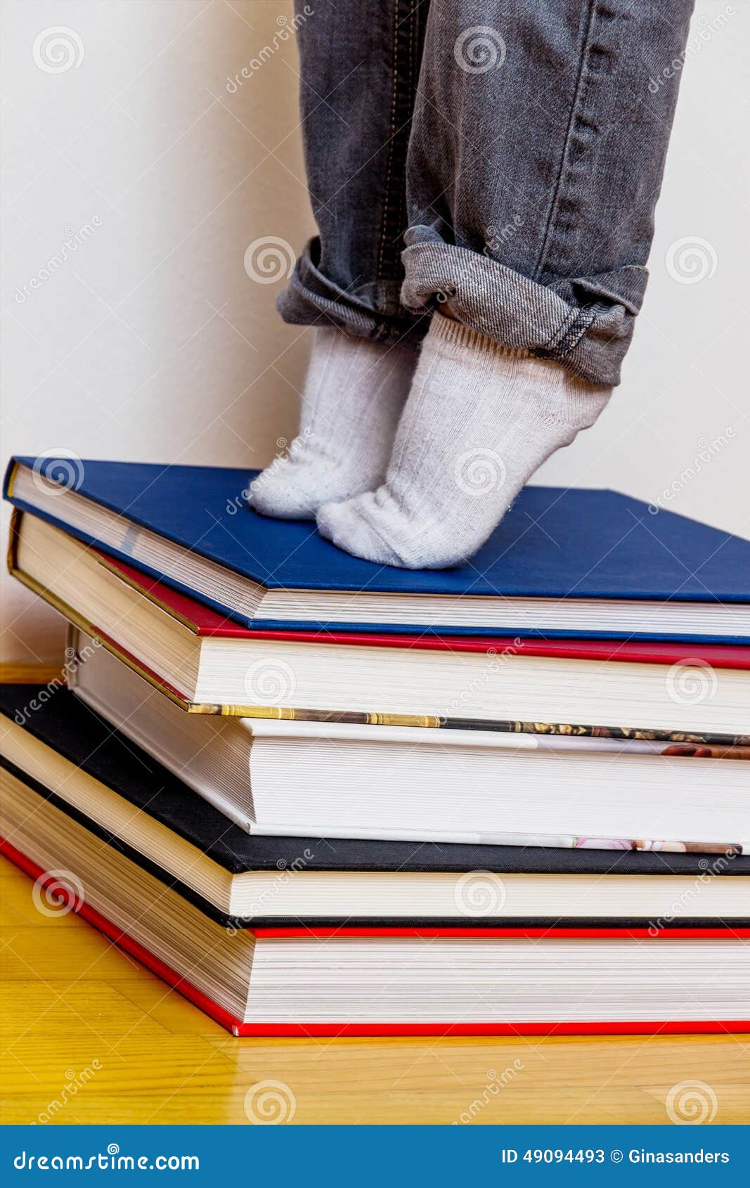 Child Standing on a Stack of Books Stock Image - Image of anonymous ...