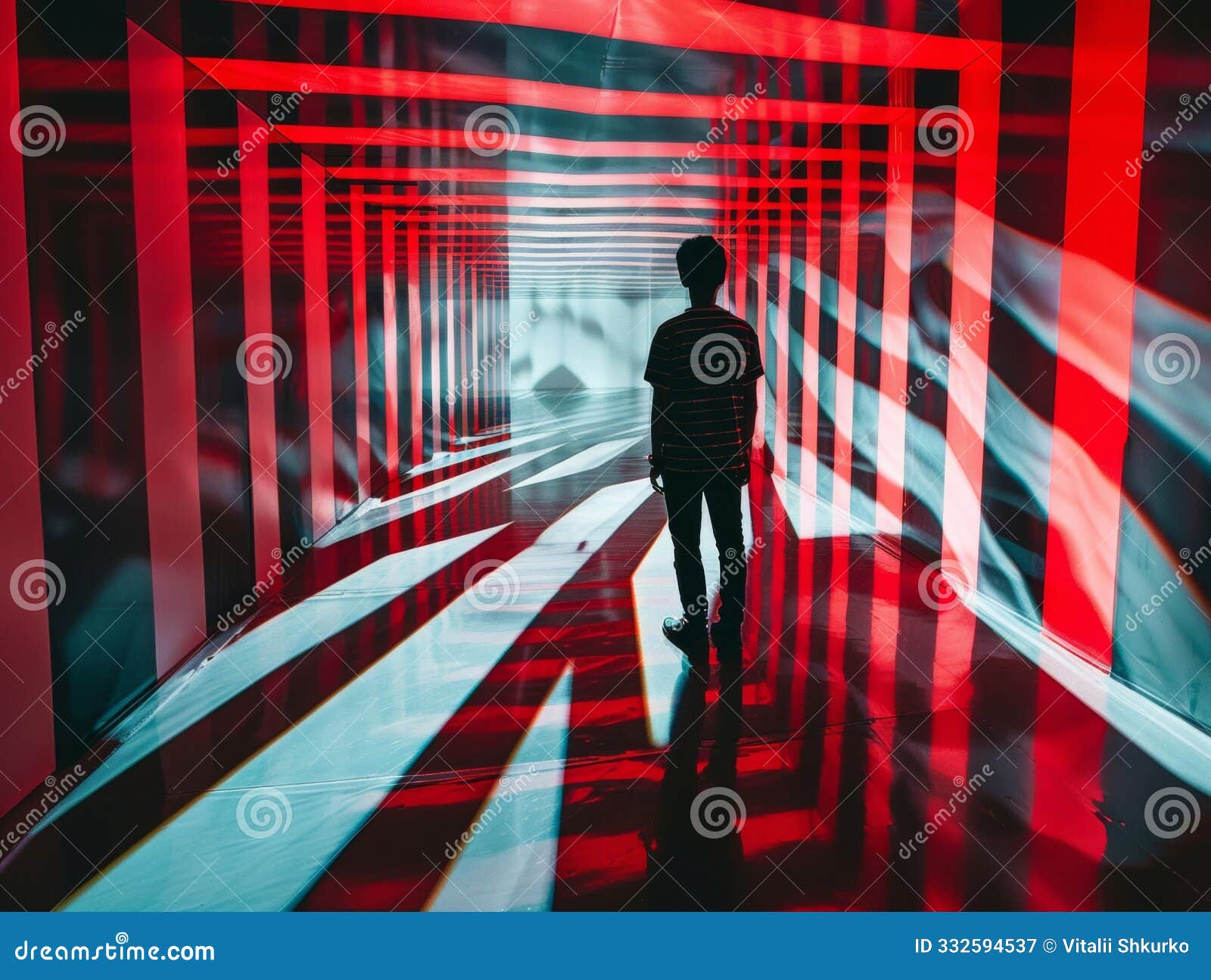 A Child Explores an Immersive Light Installation with Red and Black ...