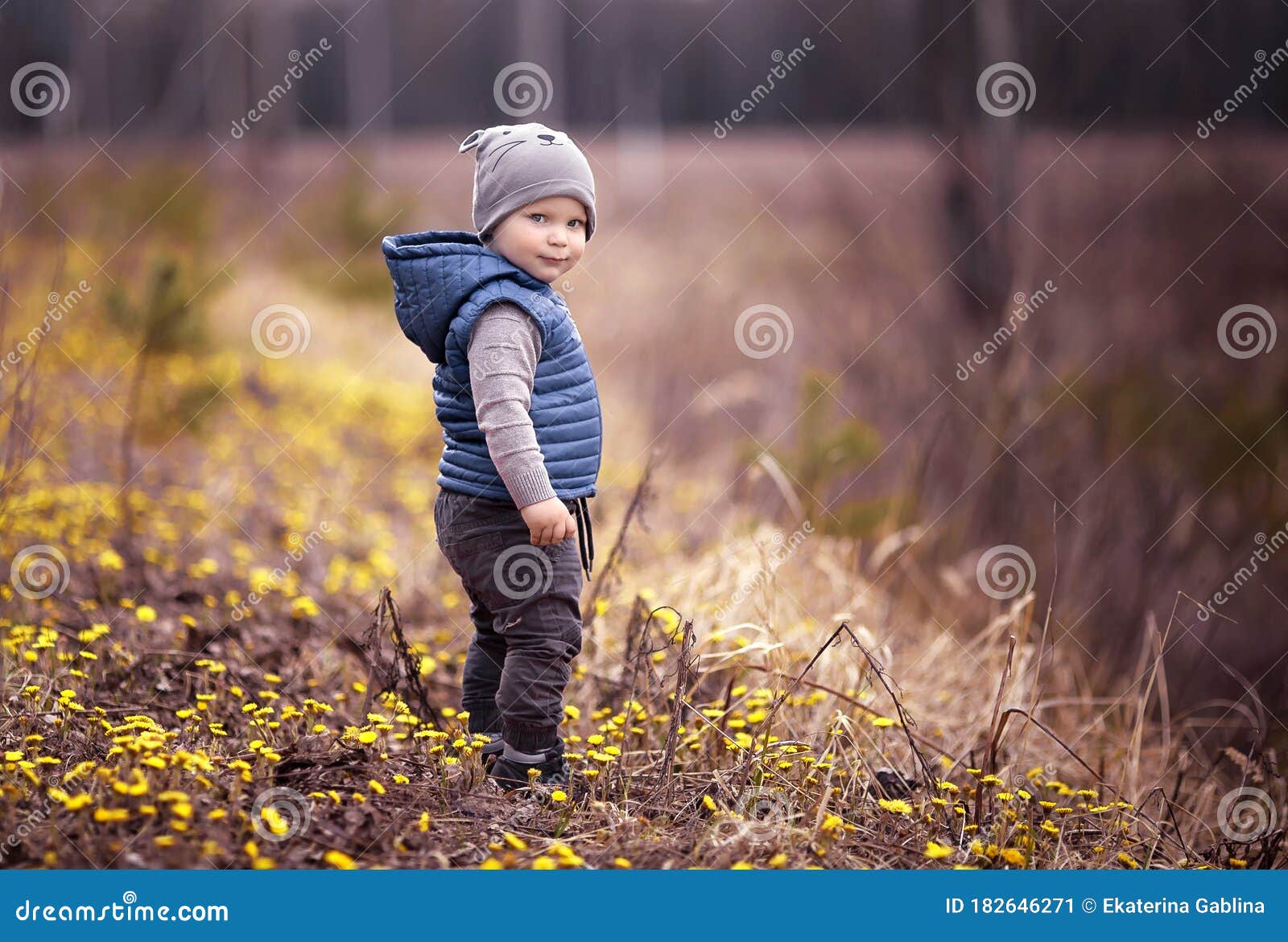 A Child Stands Near the Forest Stock Image - Image of stands, front ...