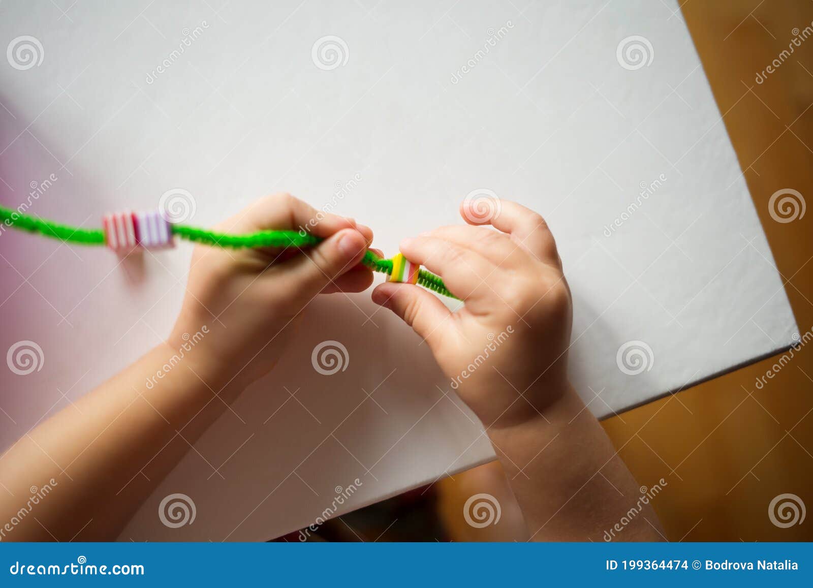 Child Stringing Beads on String. Stock Photo - Image of little, play ...