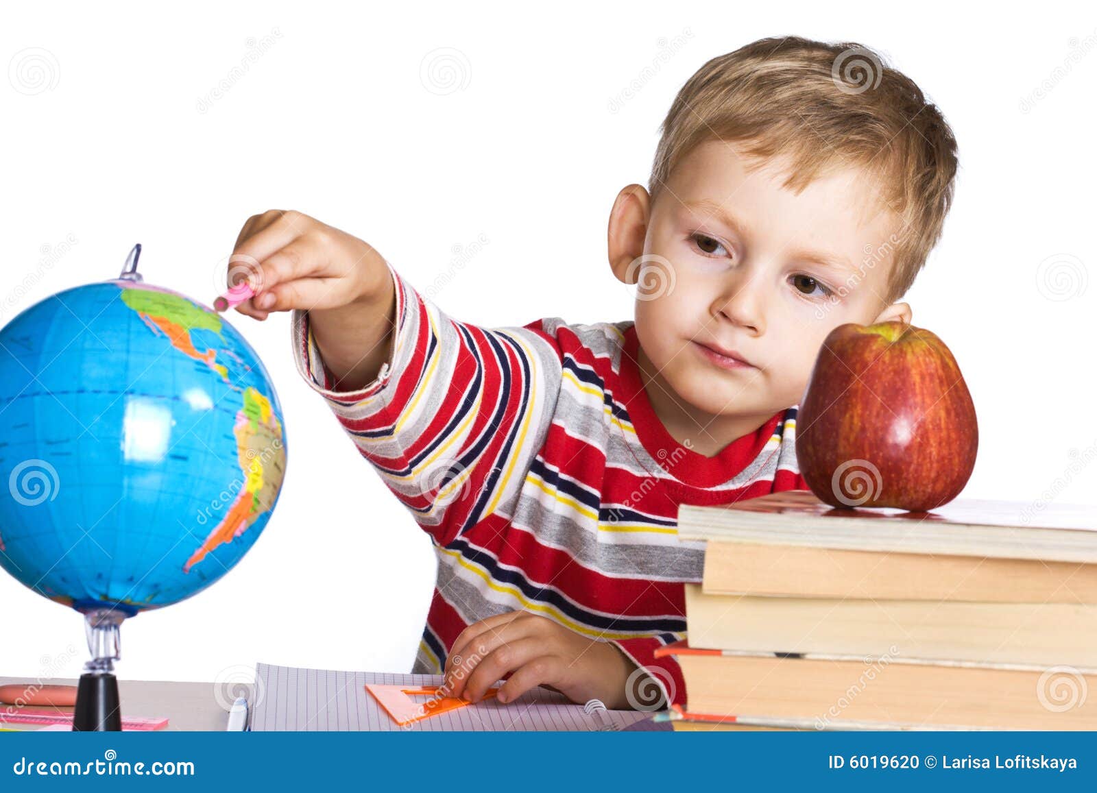 Child studies the globe stock photo. Image of childhood - 6019620