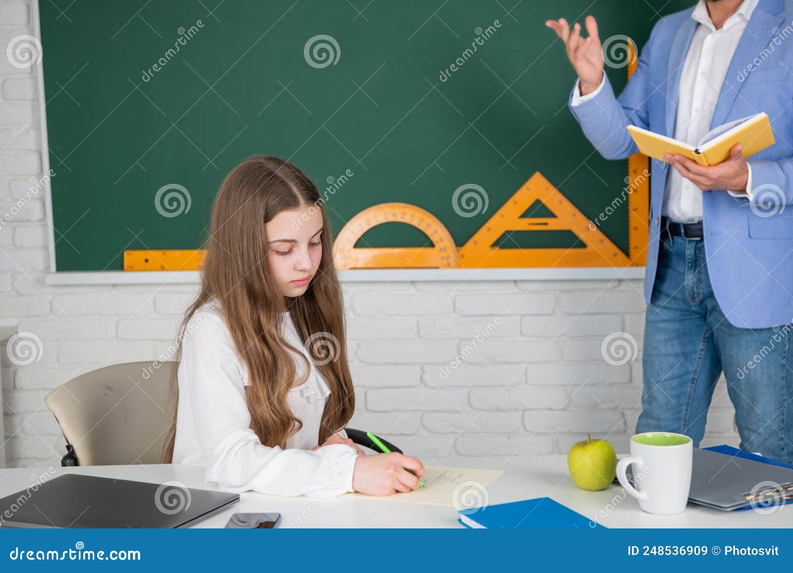 Child Study in Classroom with Cropped Teacher Stock Image - Image of ...