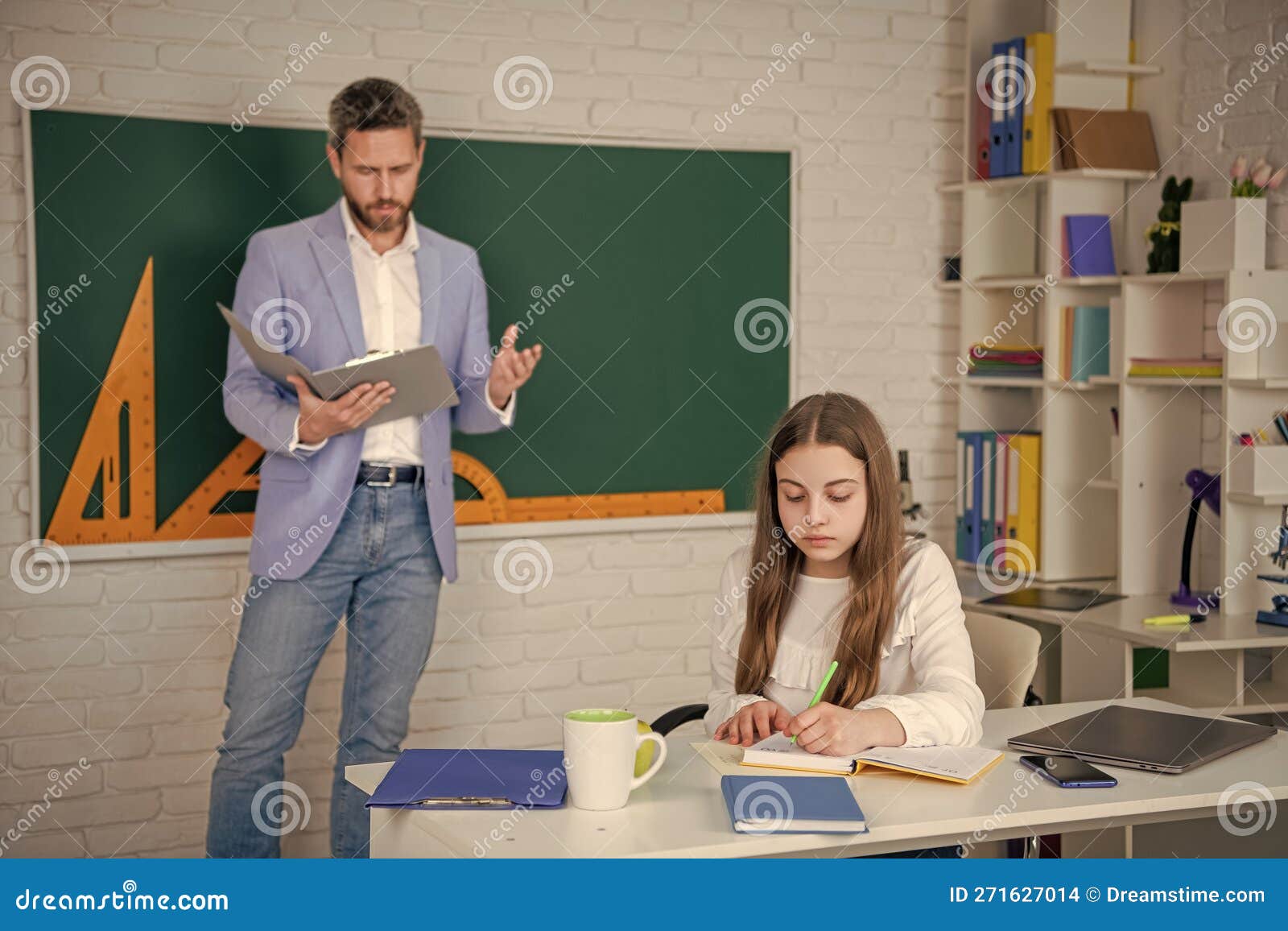 Child Study in Classroom with Teacher. Selective Focus Stock Photo ...