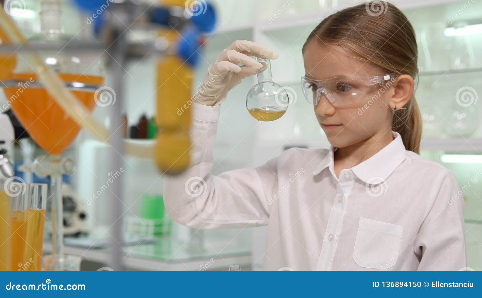 Child Studying Chemistry in School Lab, Student Girl Making Experiments ...