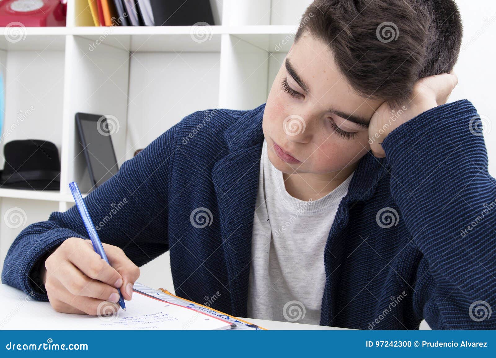 Child studying and writing stock photo. Image of literature - 97242300