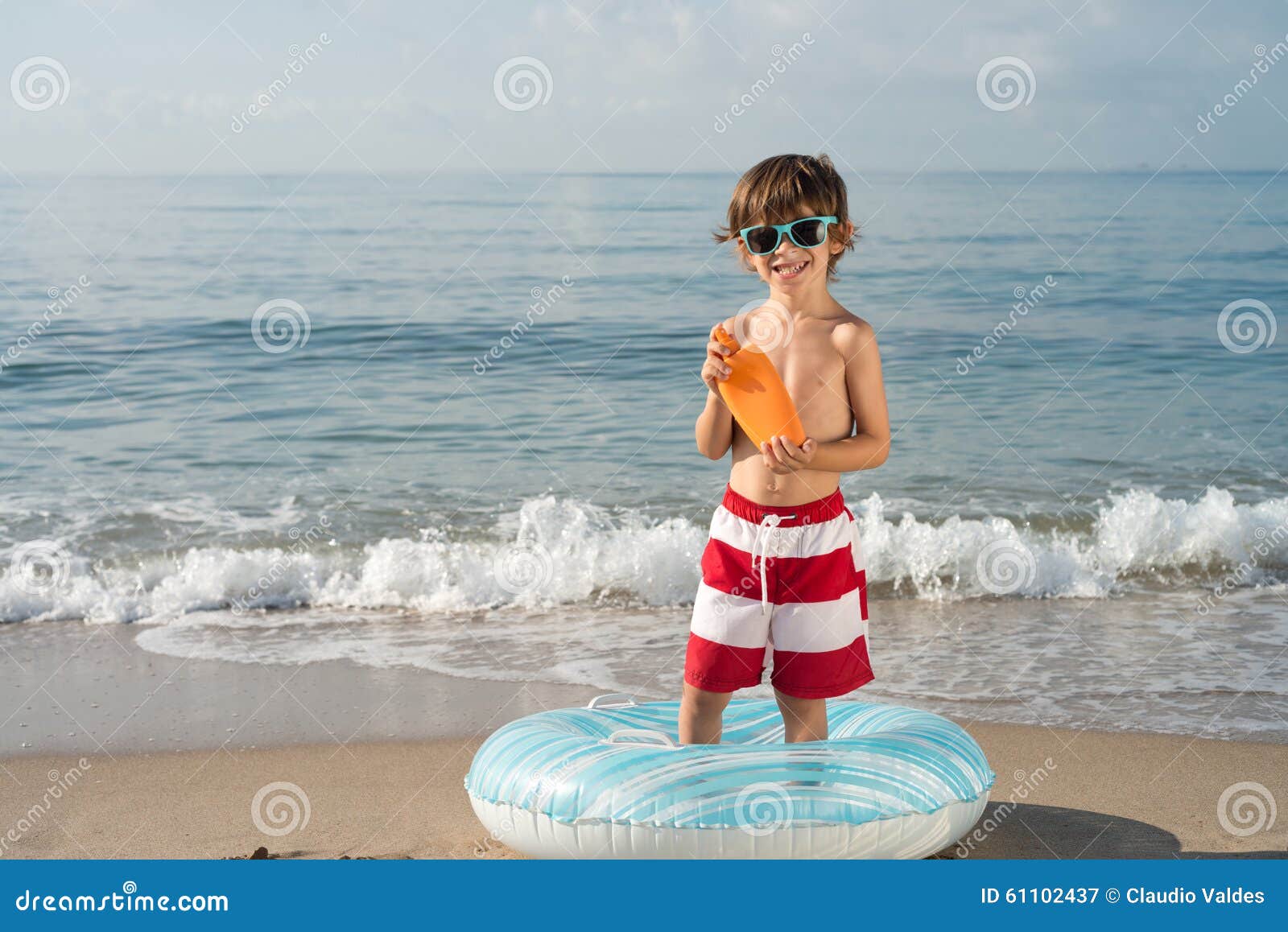 Child with Sun Protection Spray in the Beach Stock Image - Image of ...