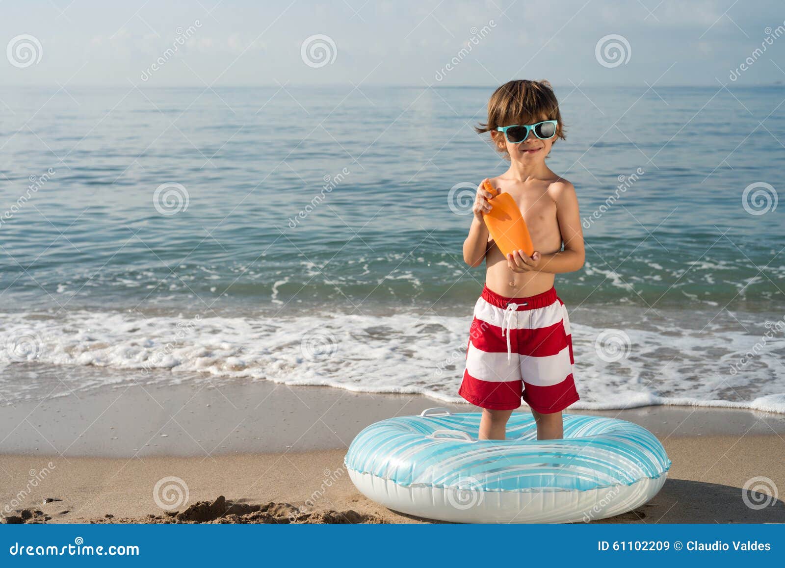 Child with Sun Protection Spray Under Float Stock Image - Image of ...