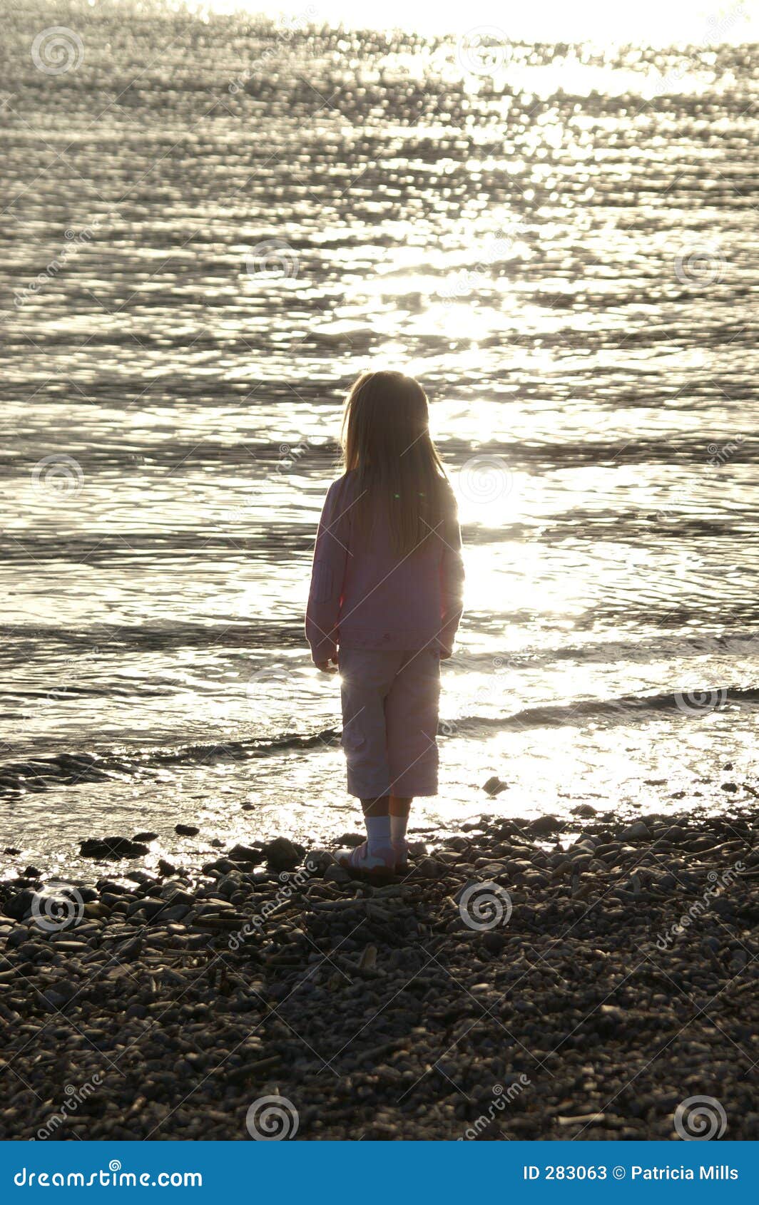 Child at sunset stock image. Image of late, girl, silhouette - 283063